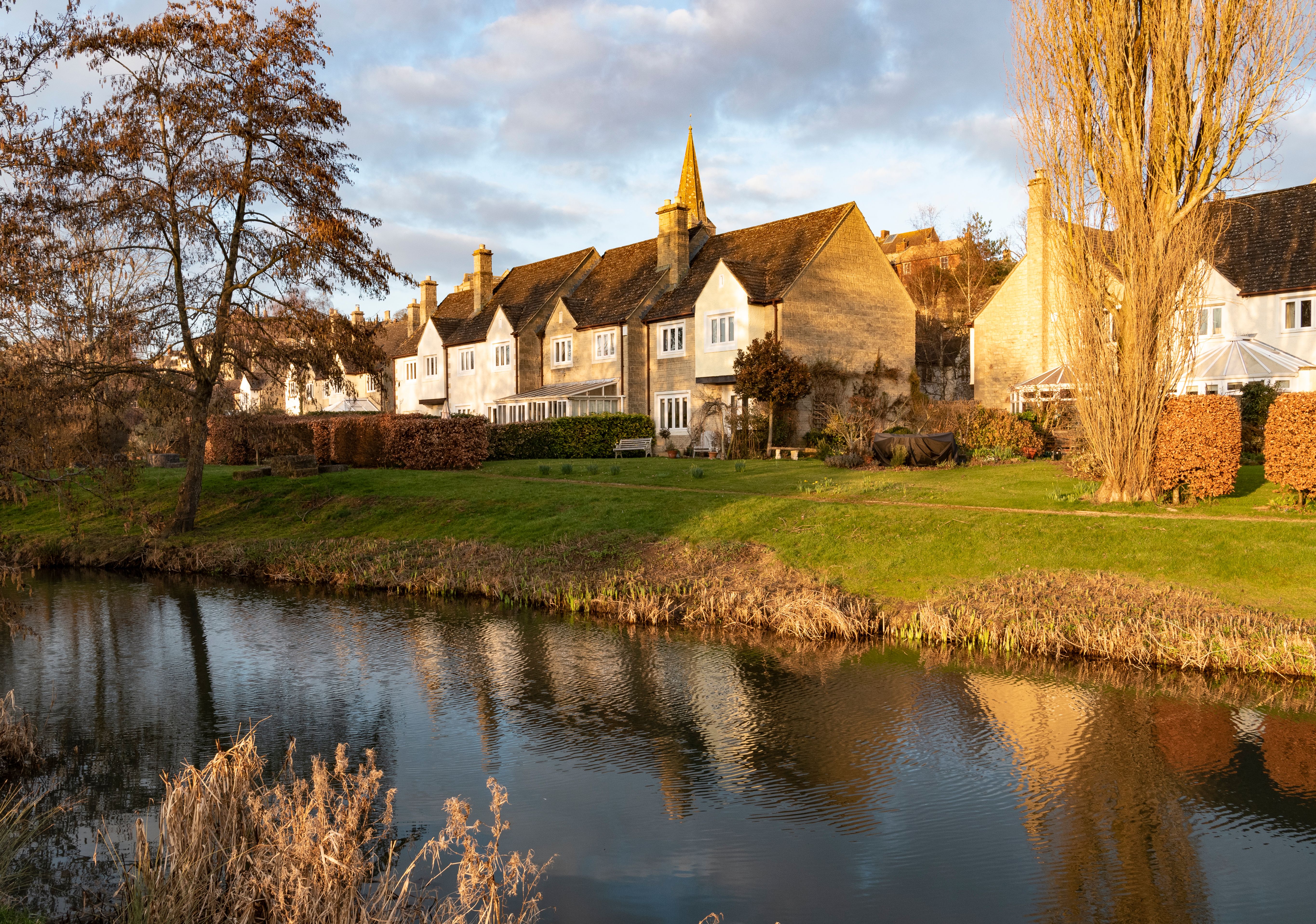 A River Against the Townscape Background · Free Stock Photo