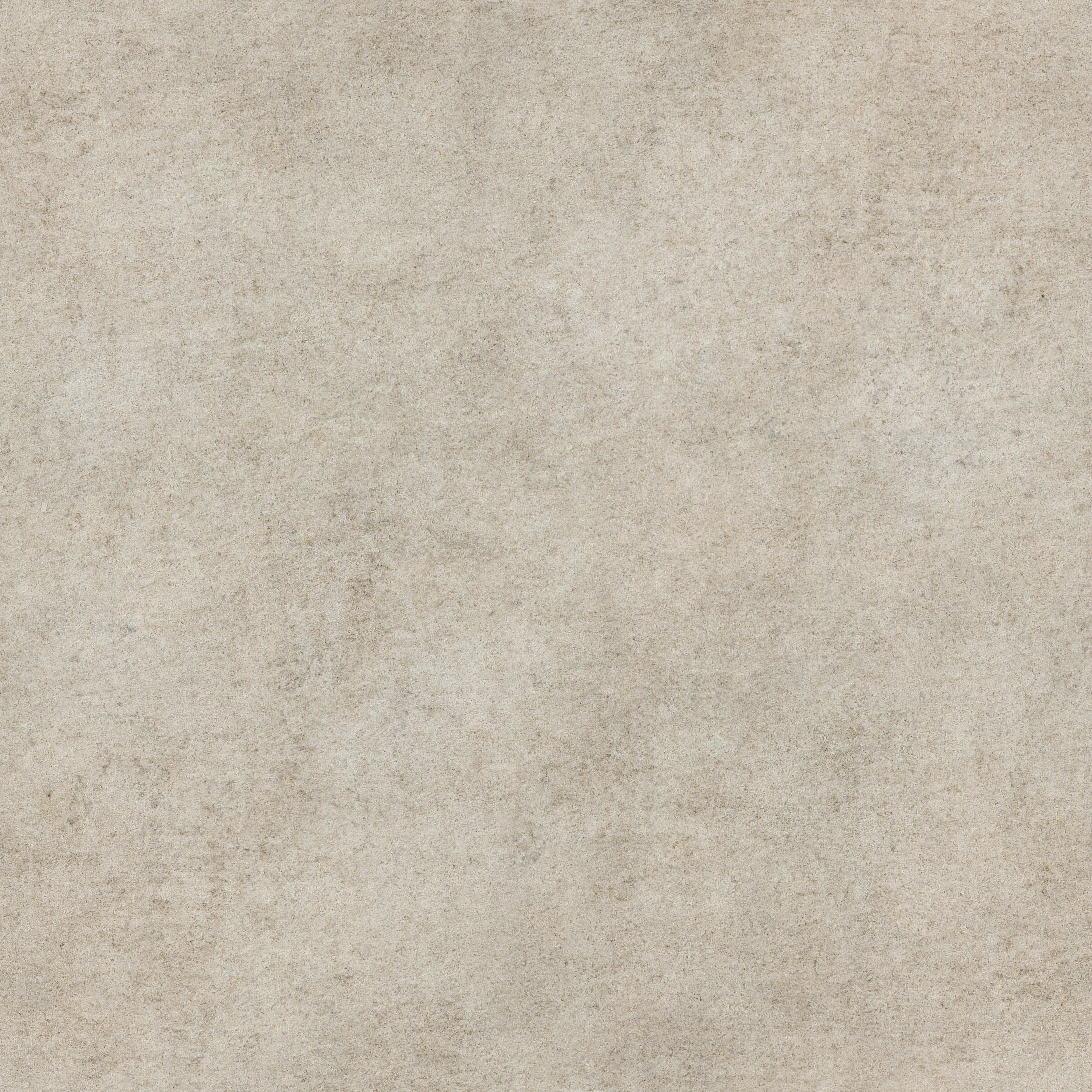 A beige background with some light gray stains · Free Stock Photo