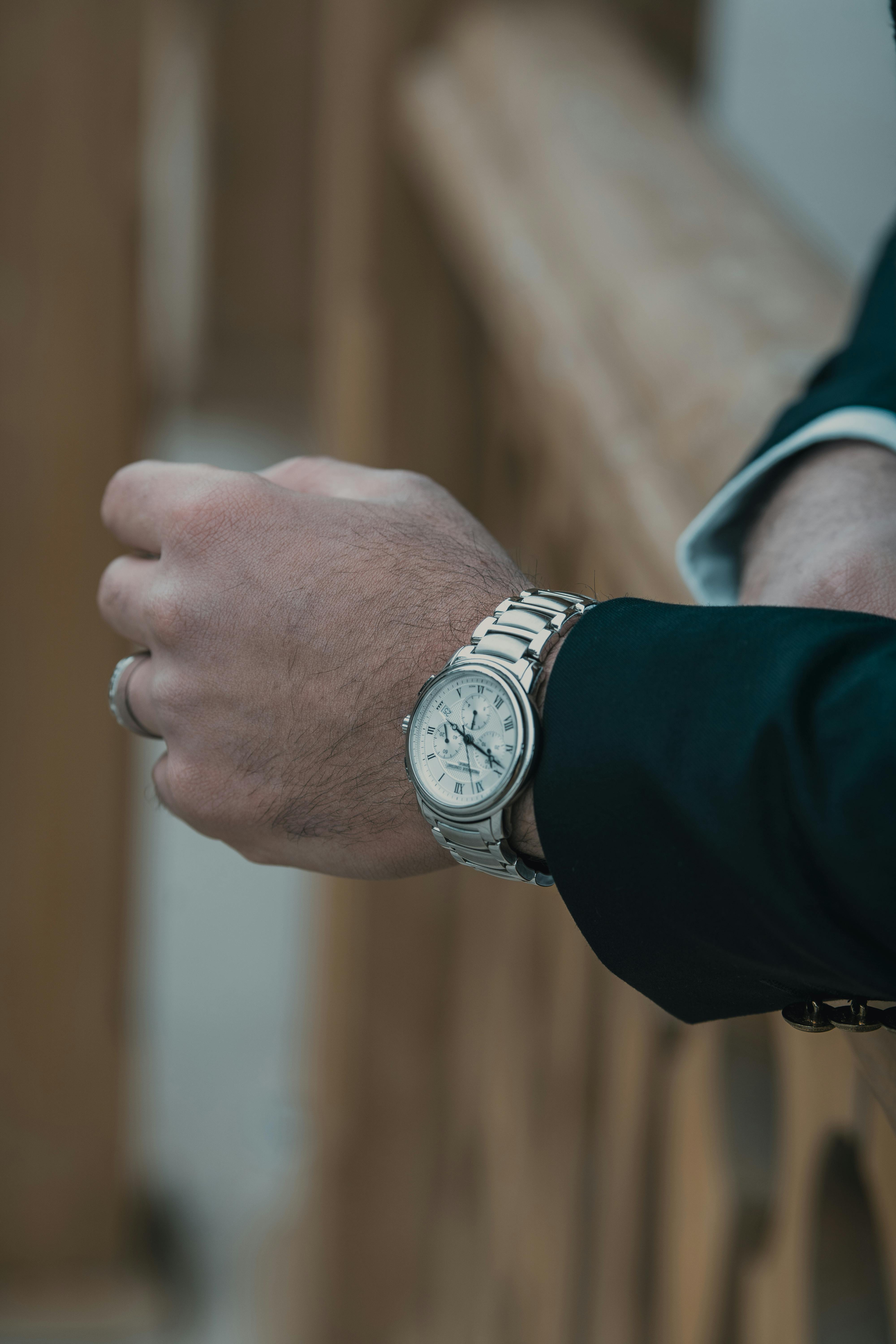 Person Wearing Black Analog Watch · Free Stock Photo