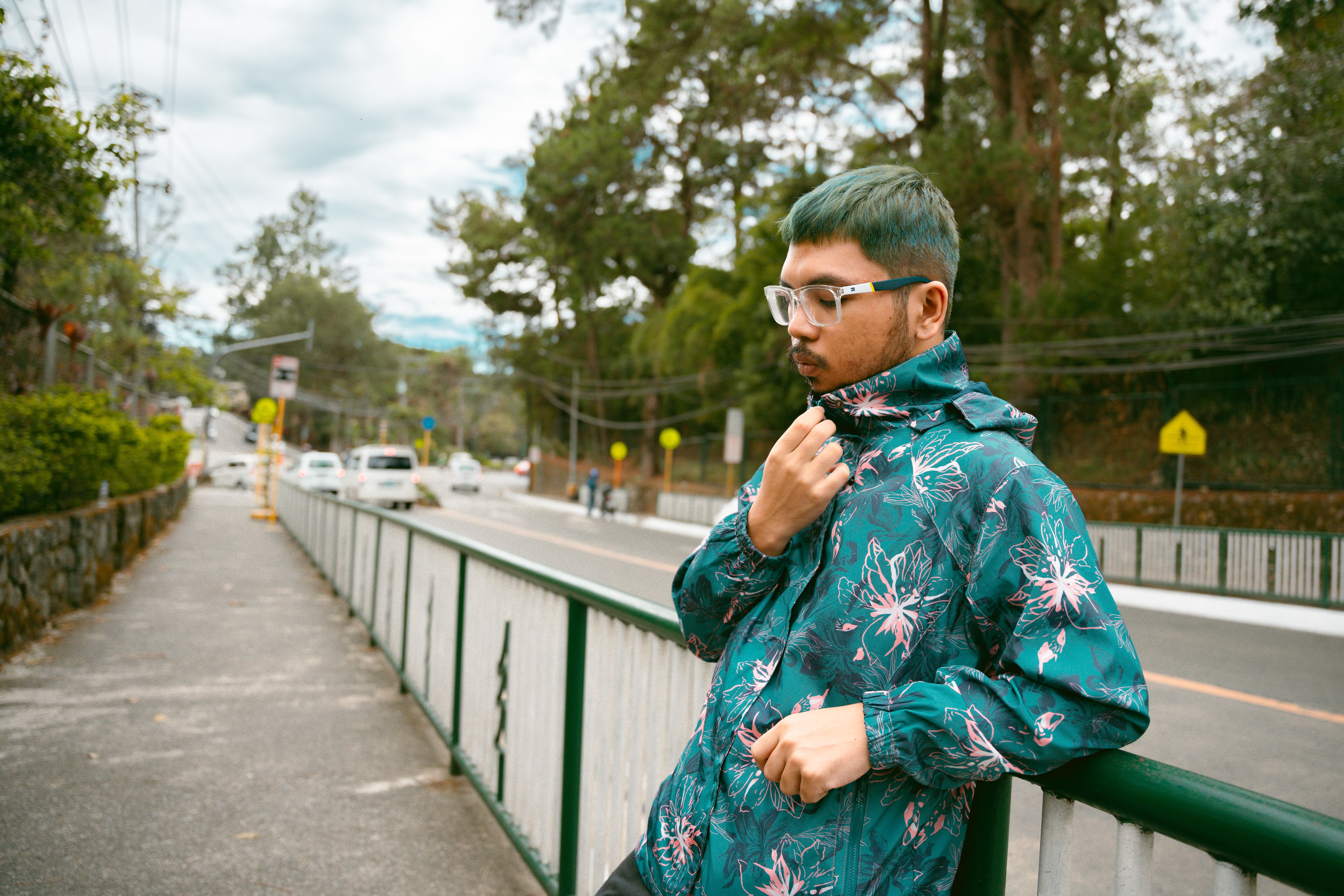 Man Wearing Rain Jacket by the Street · Free Stock Photo