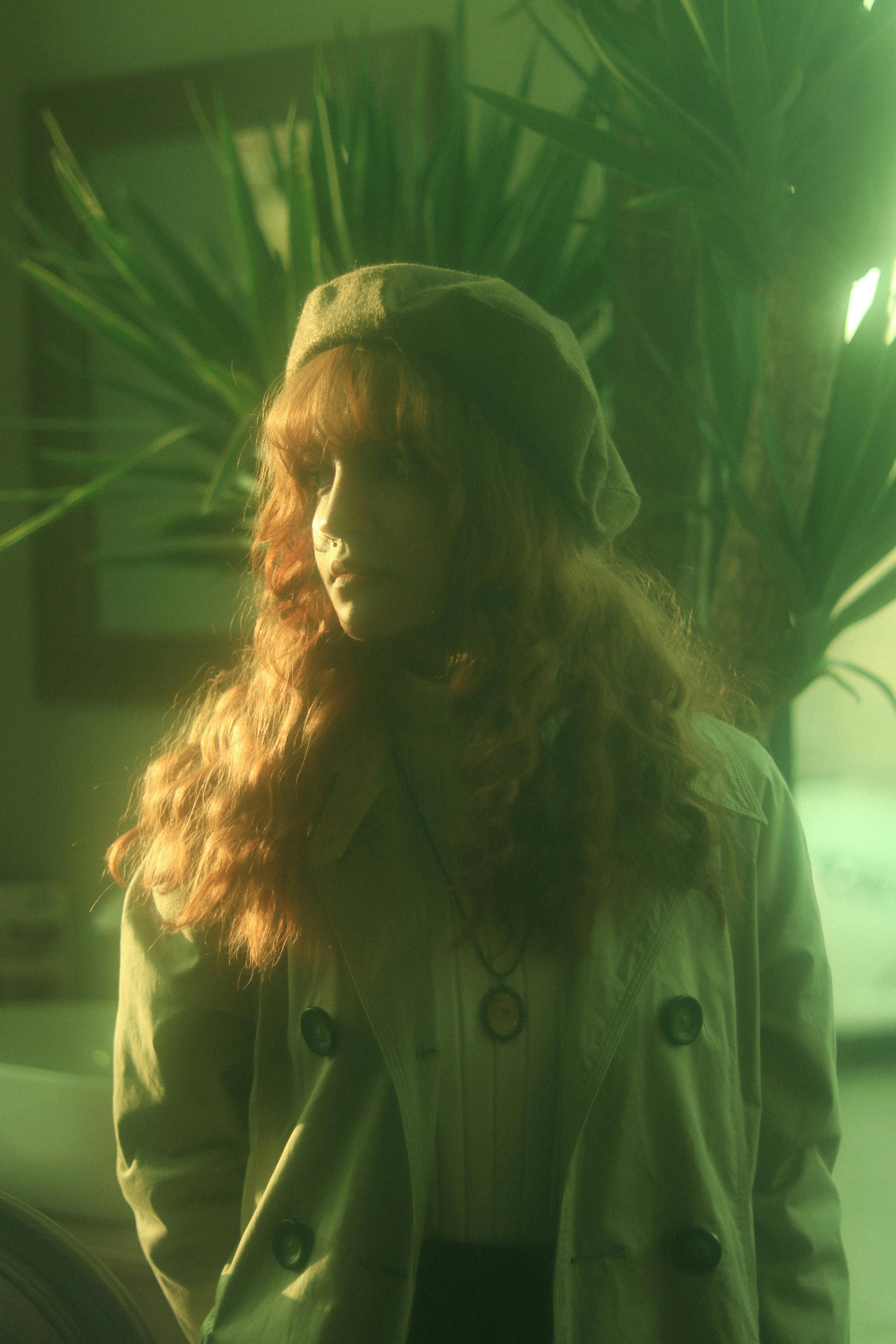 Woman Wearing Beret in Green Light · Free Stock Photo