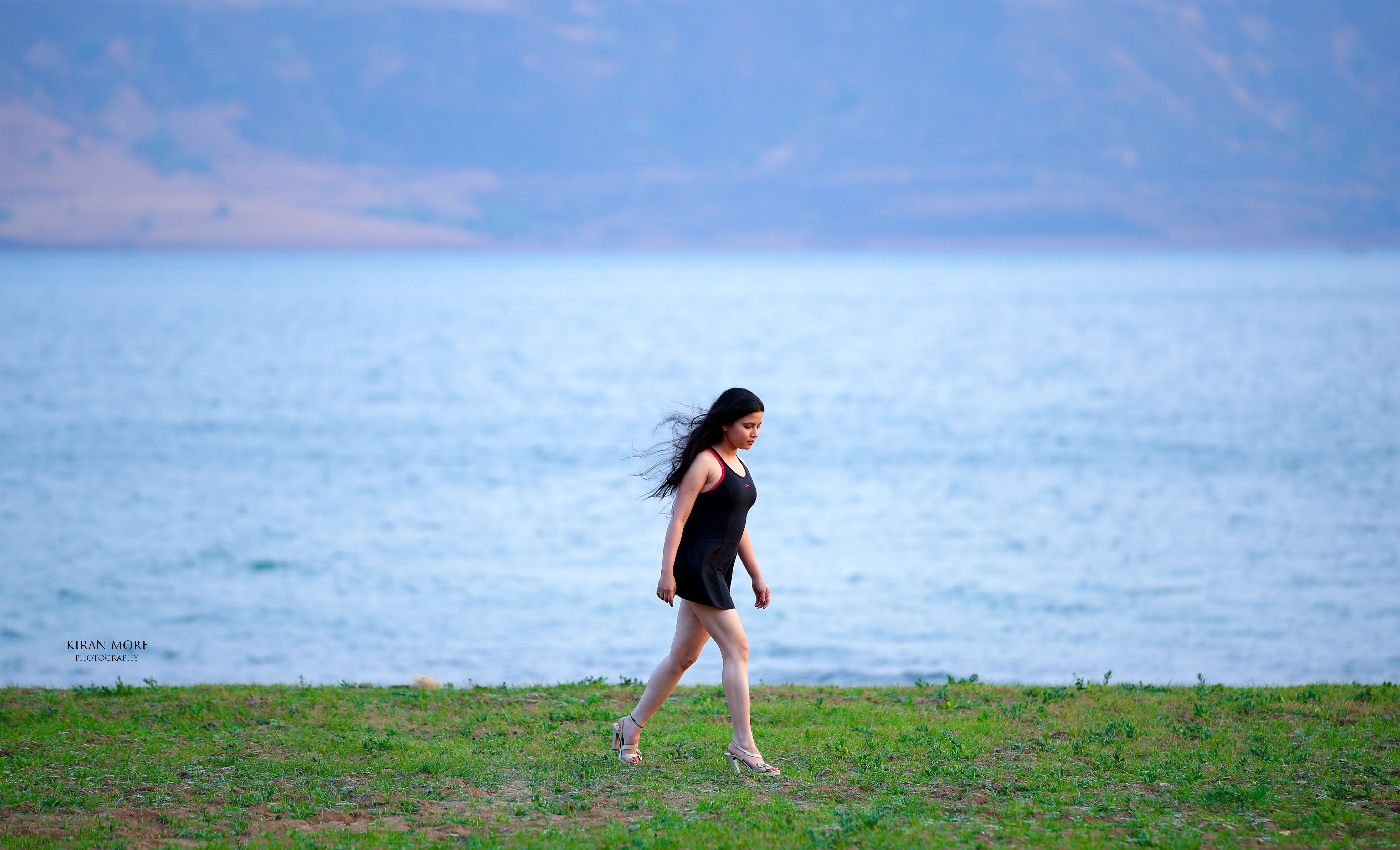 Woman Walking By the Lake · Free Stock Photo