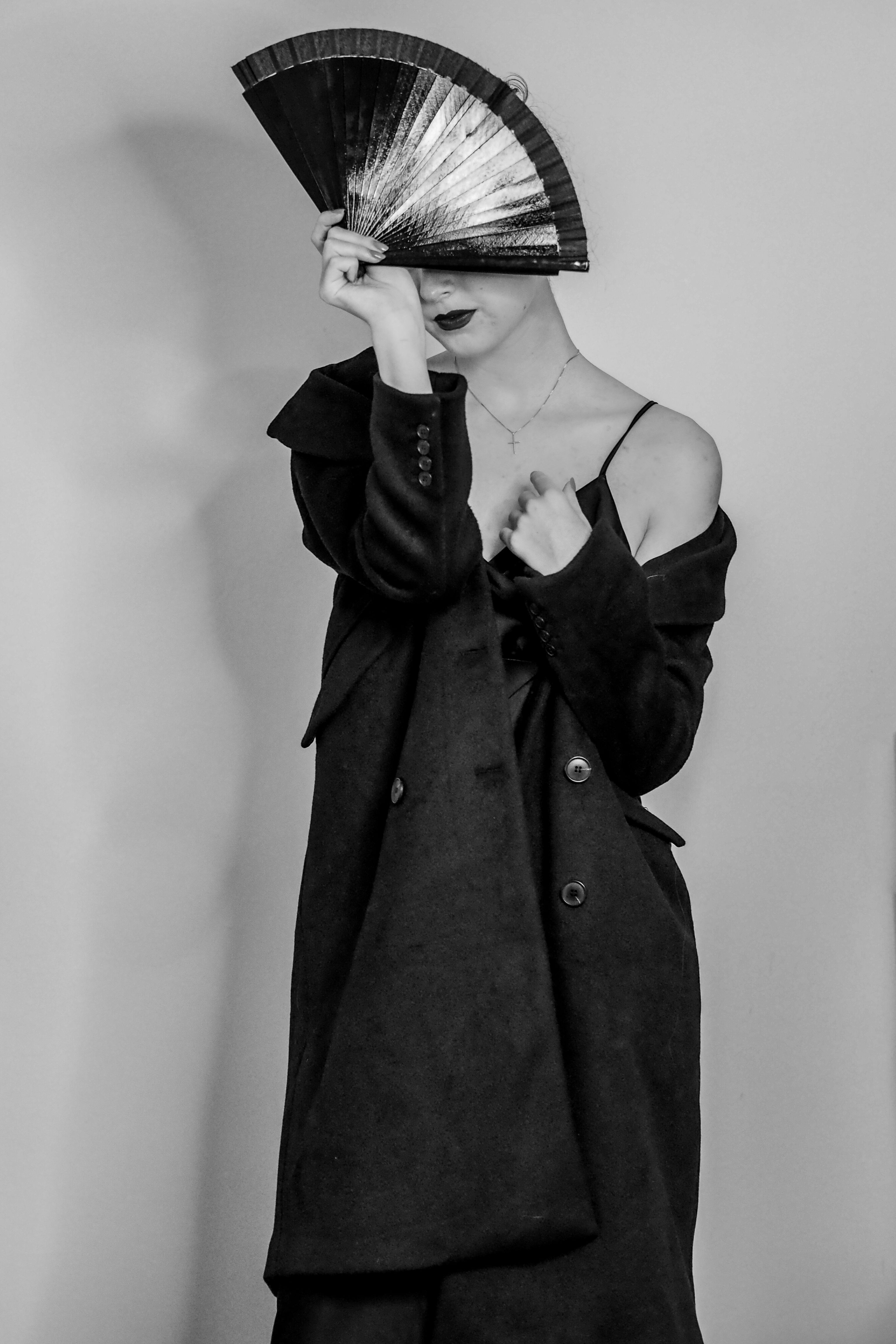Portrait of Woman with Fan and in Coat · Free Stock Photo