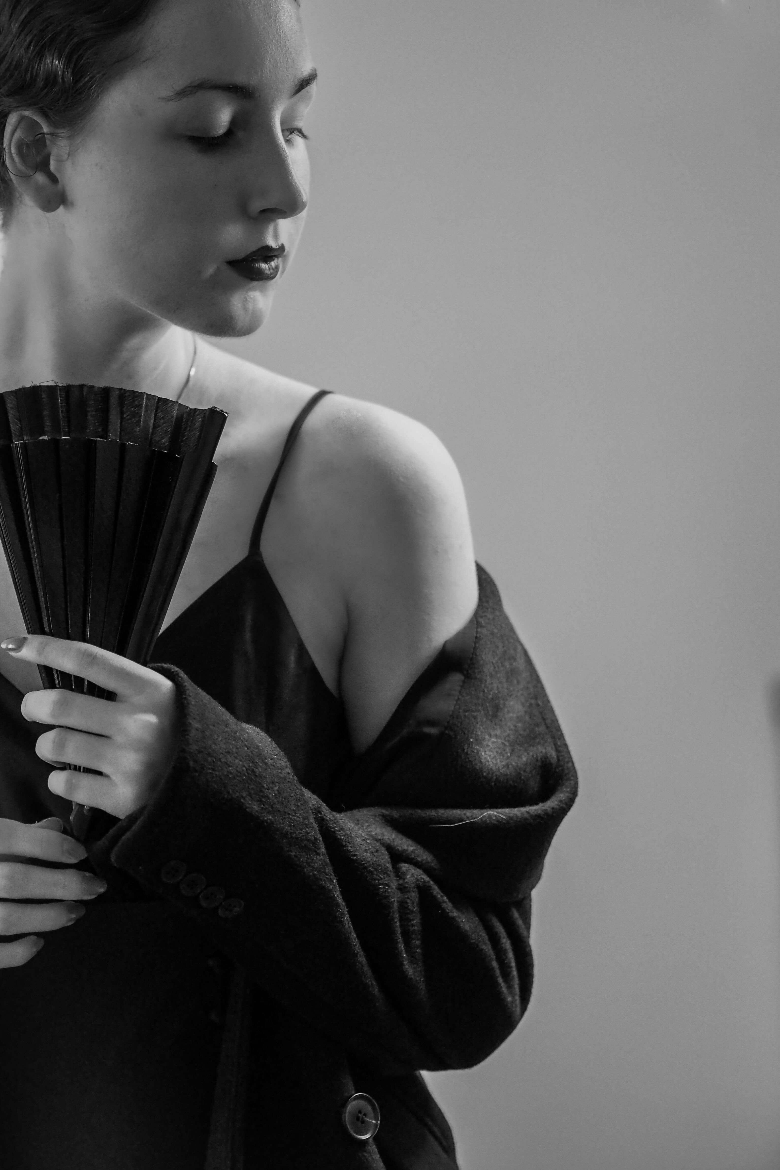 Woman Portrait with Fan · Free Stock Photo