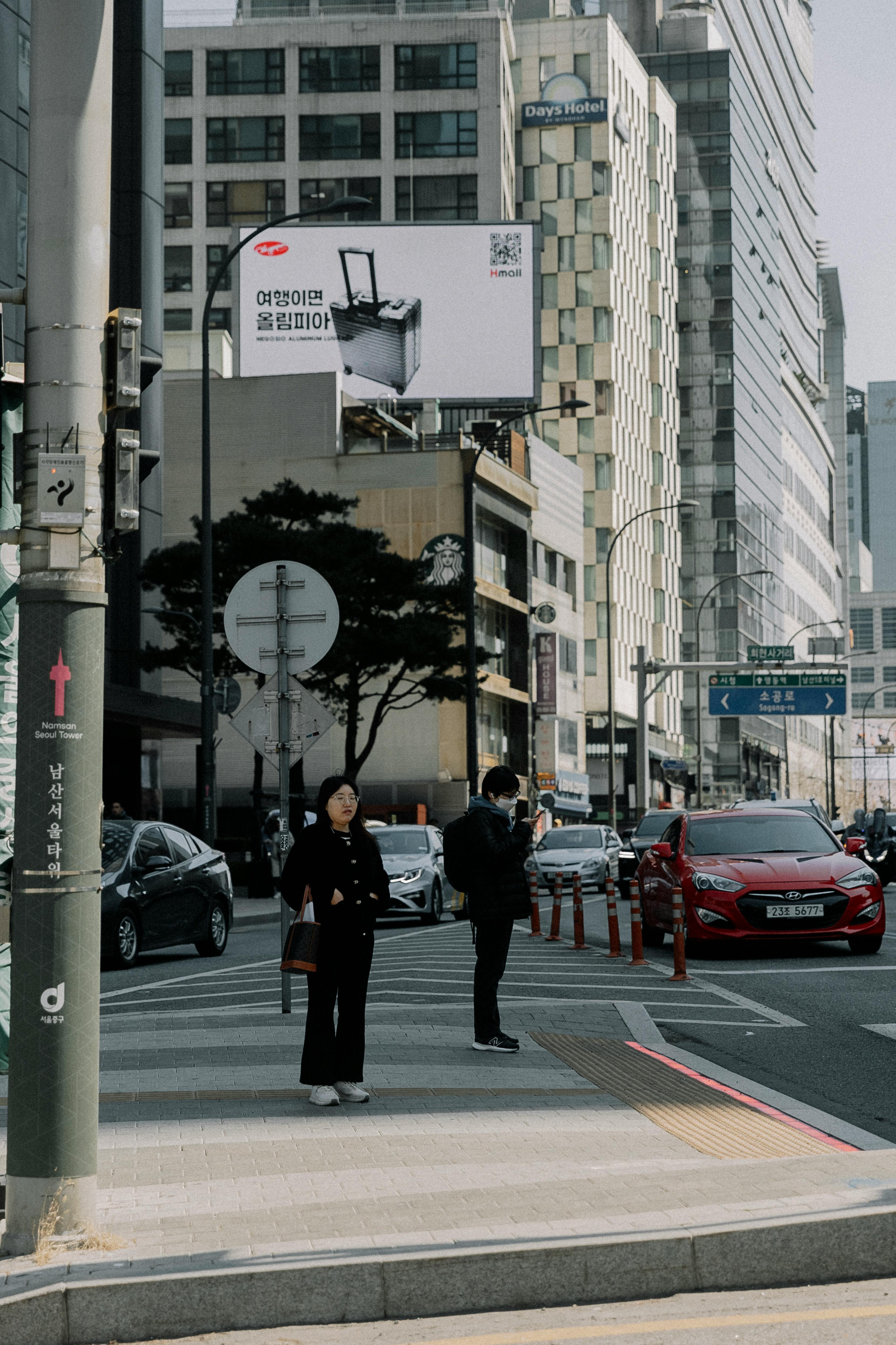Pedestrians on a Busy Downtown Street · Free Stock Photo