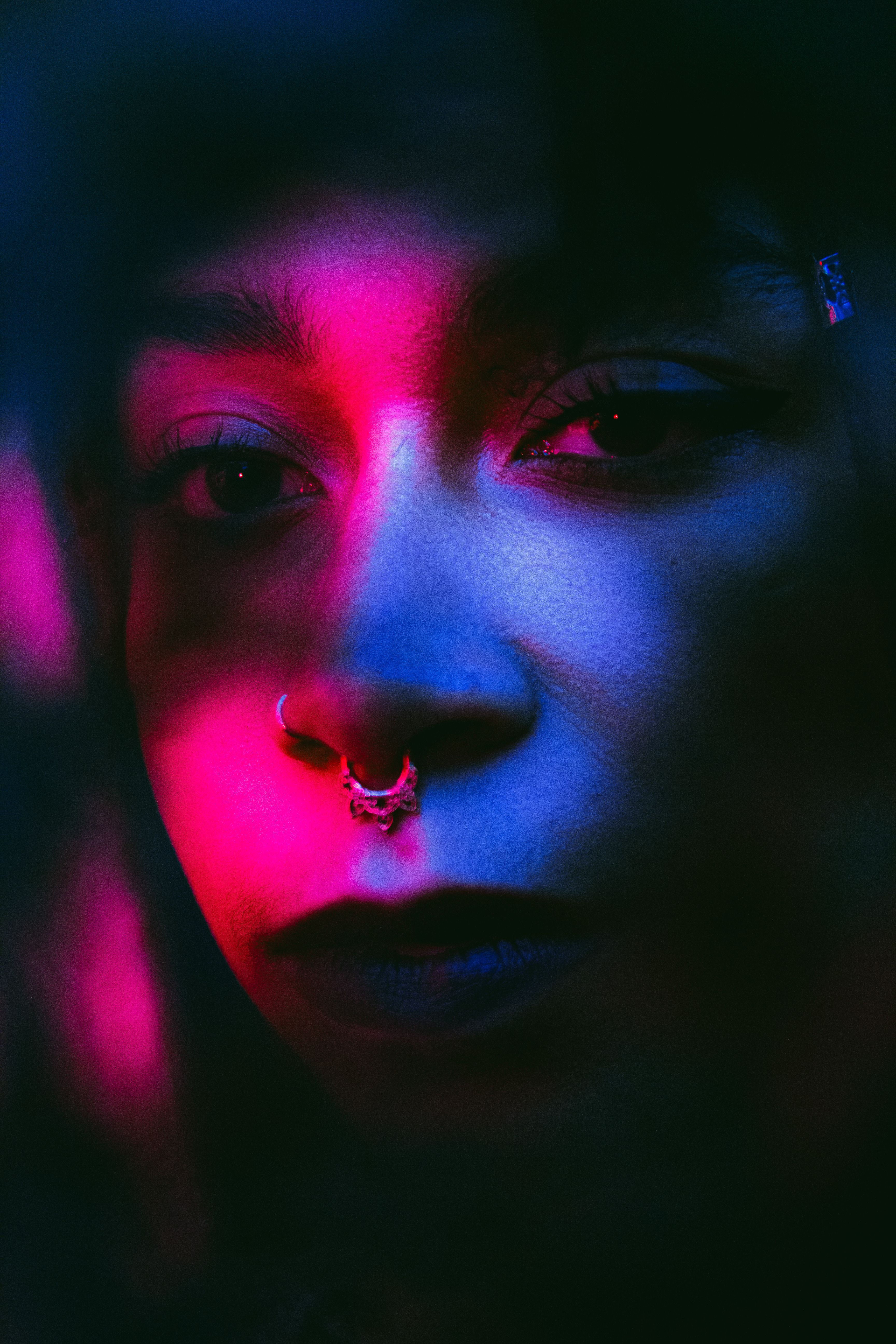 Woman with Nose Piercing in Neon Lights · Free Stock Photo