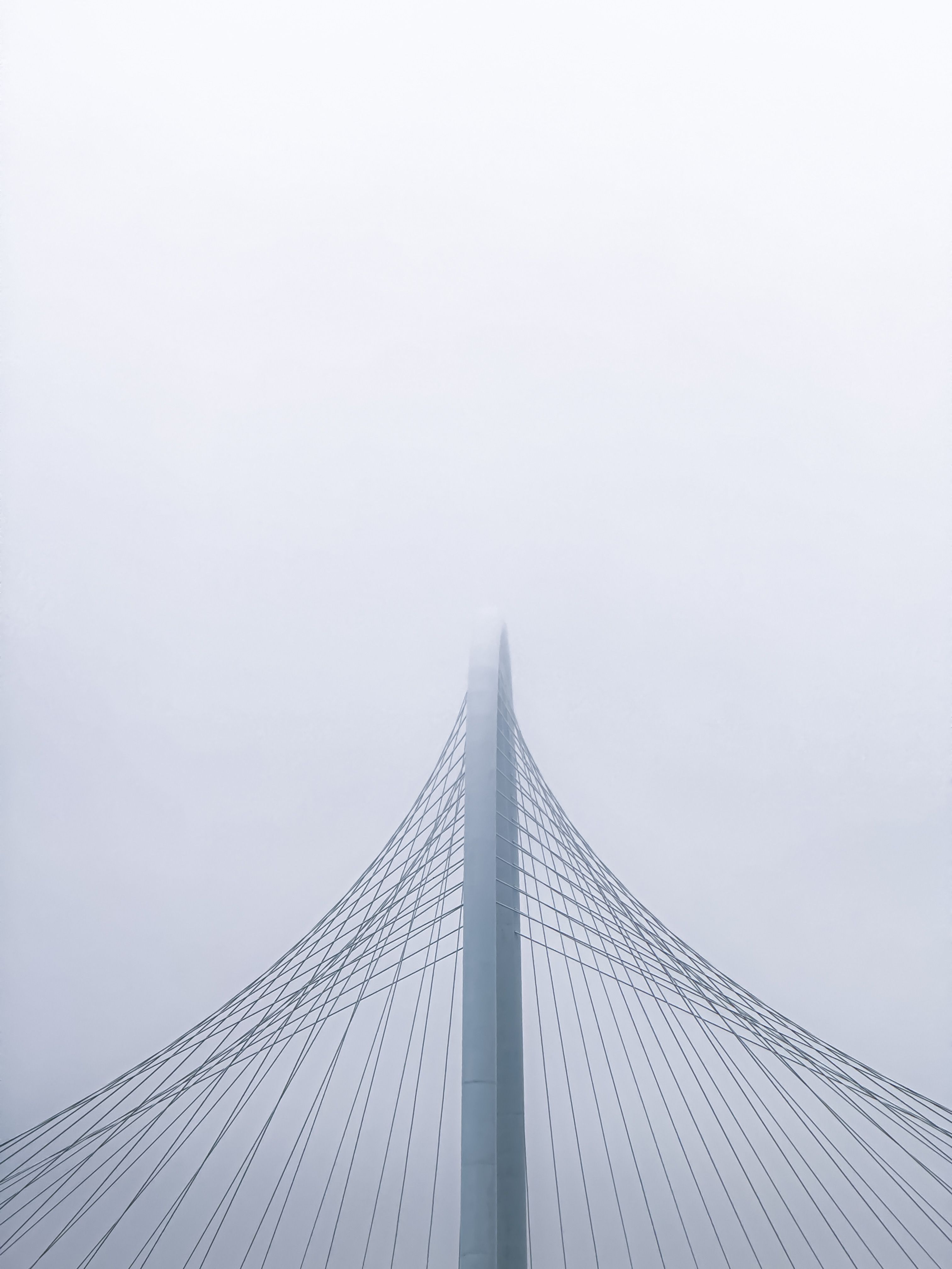 Column of a Bridge Covered in Mist · Free Stock Photo