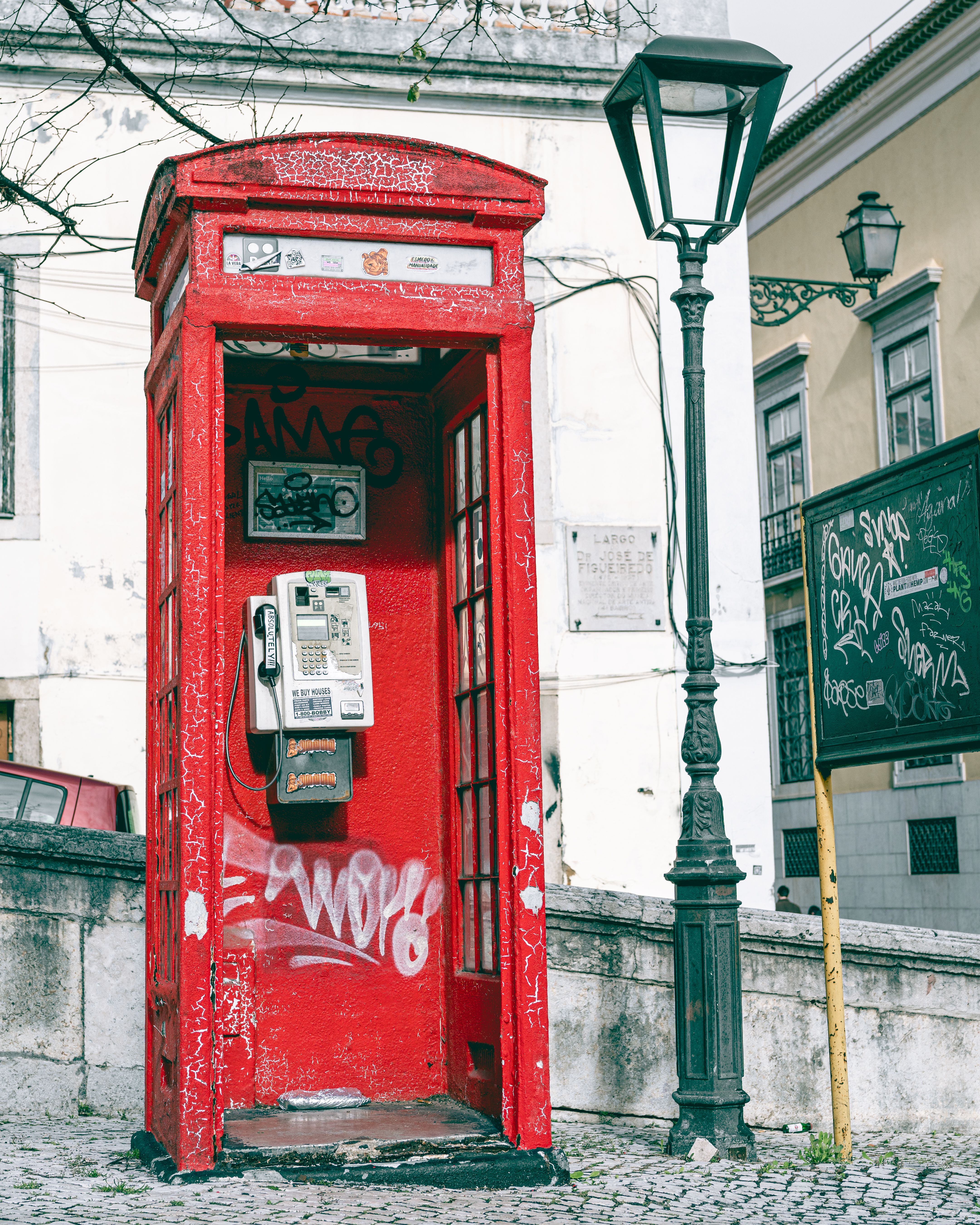 Red Phone Booth on a Street · Free Stock Photo