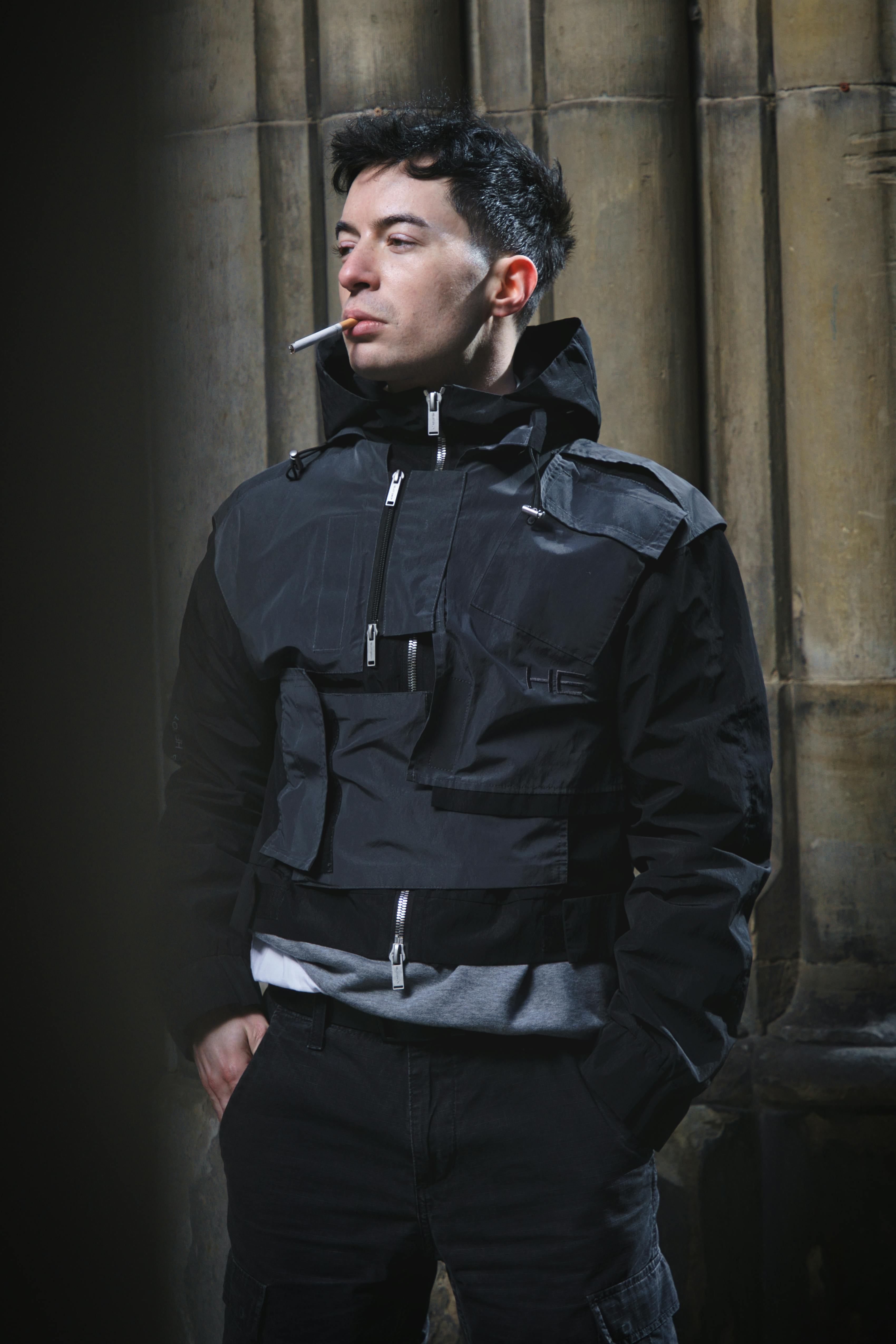 Man in Black Hooded Jacket Smoking Cigarette · Free Stock Photo