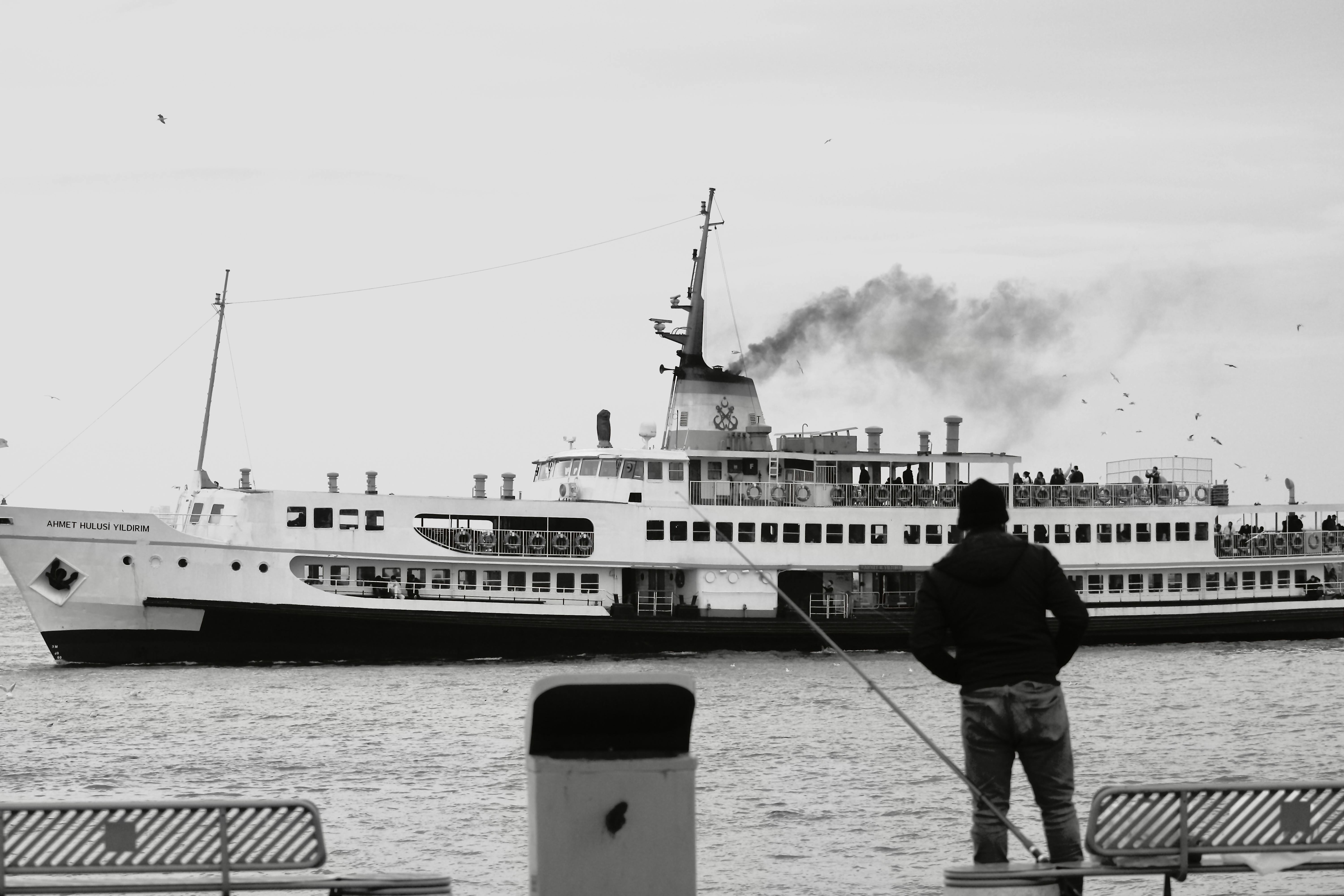 Man Looking at Ship · Free Stock Photo