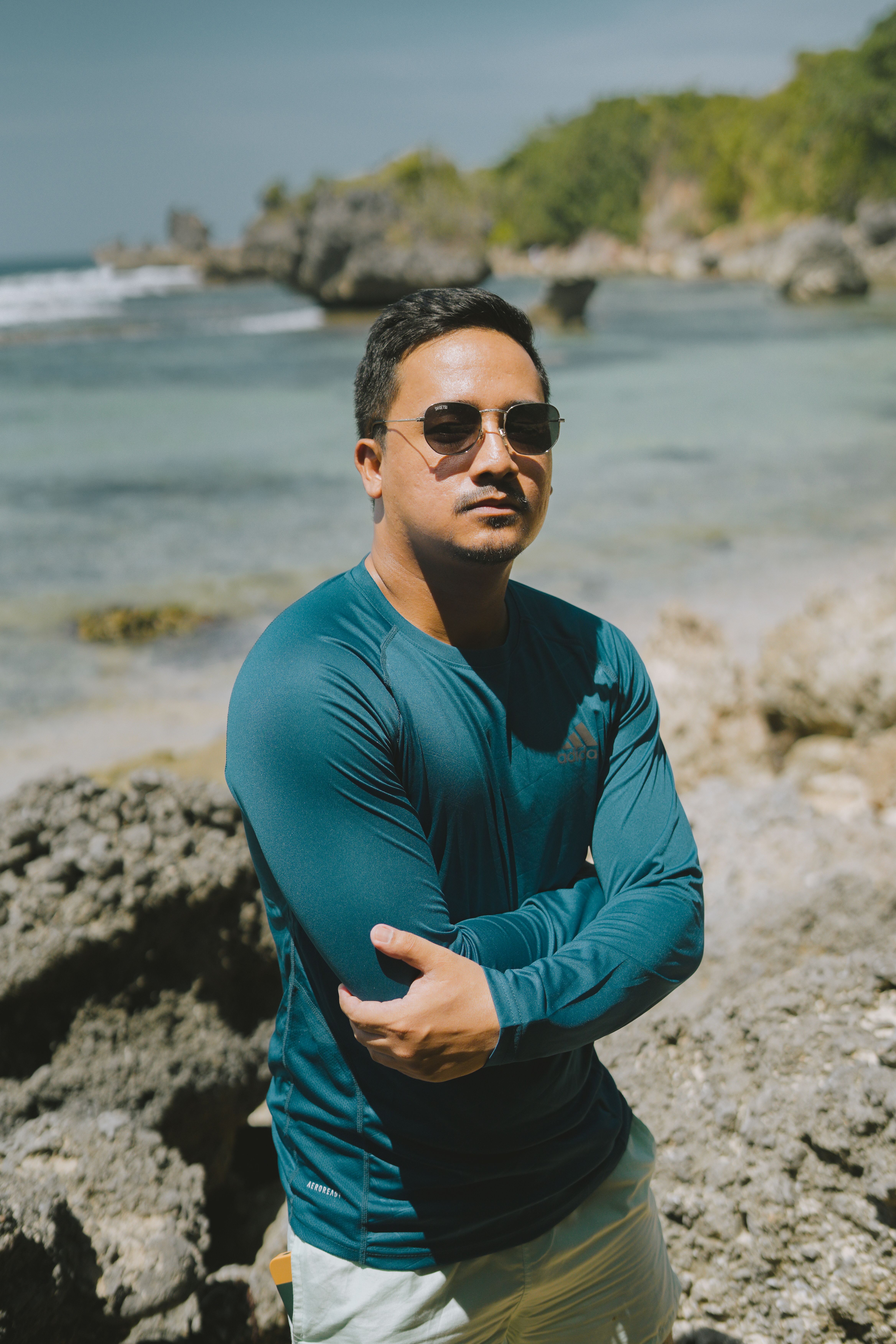 Man in Sweatshirt on Beach · Free Stock Photo