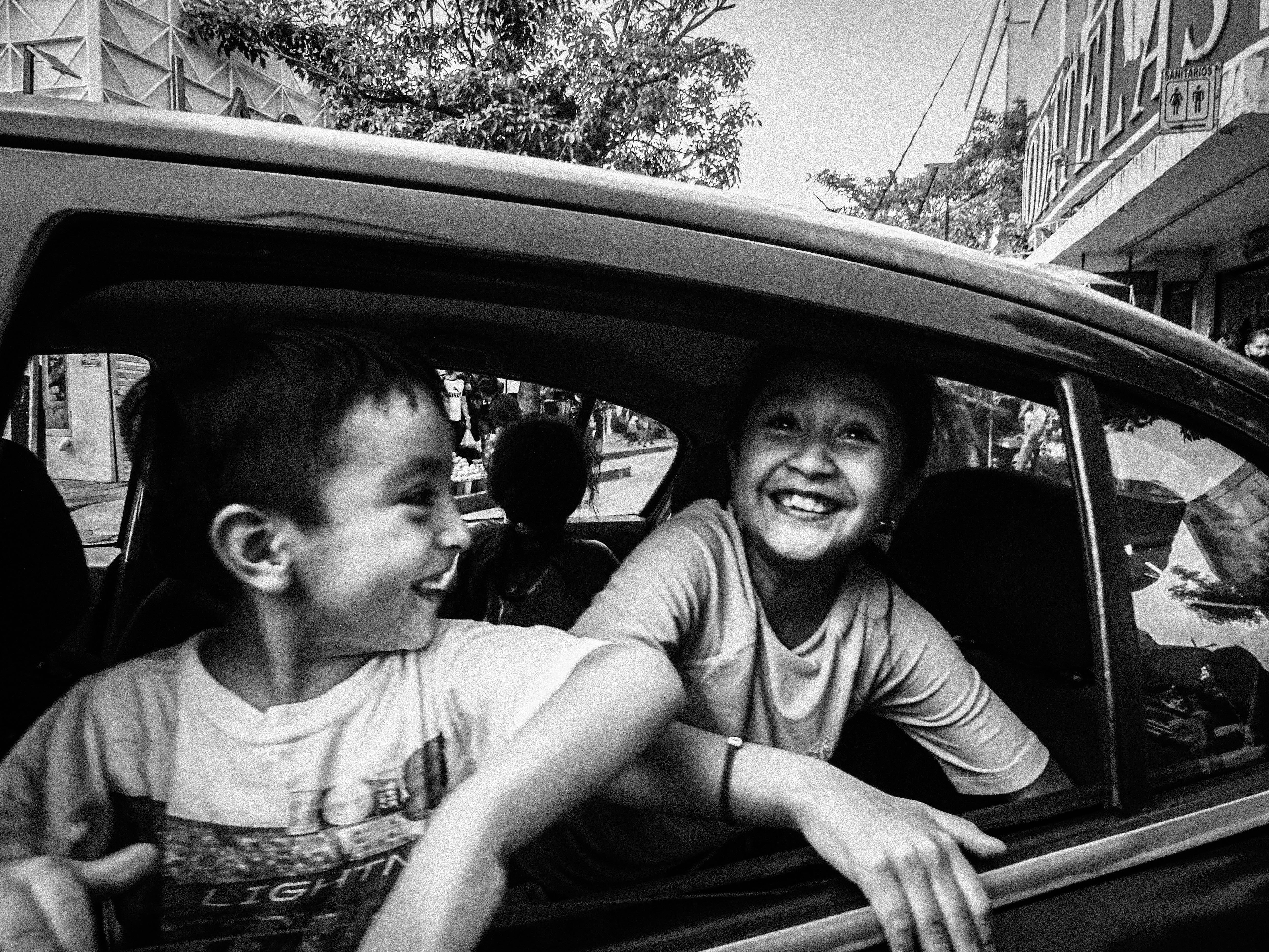 Happy Children in Car · Free Stock Photo