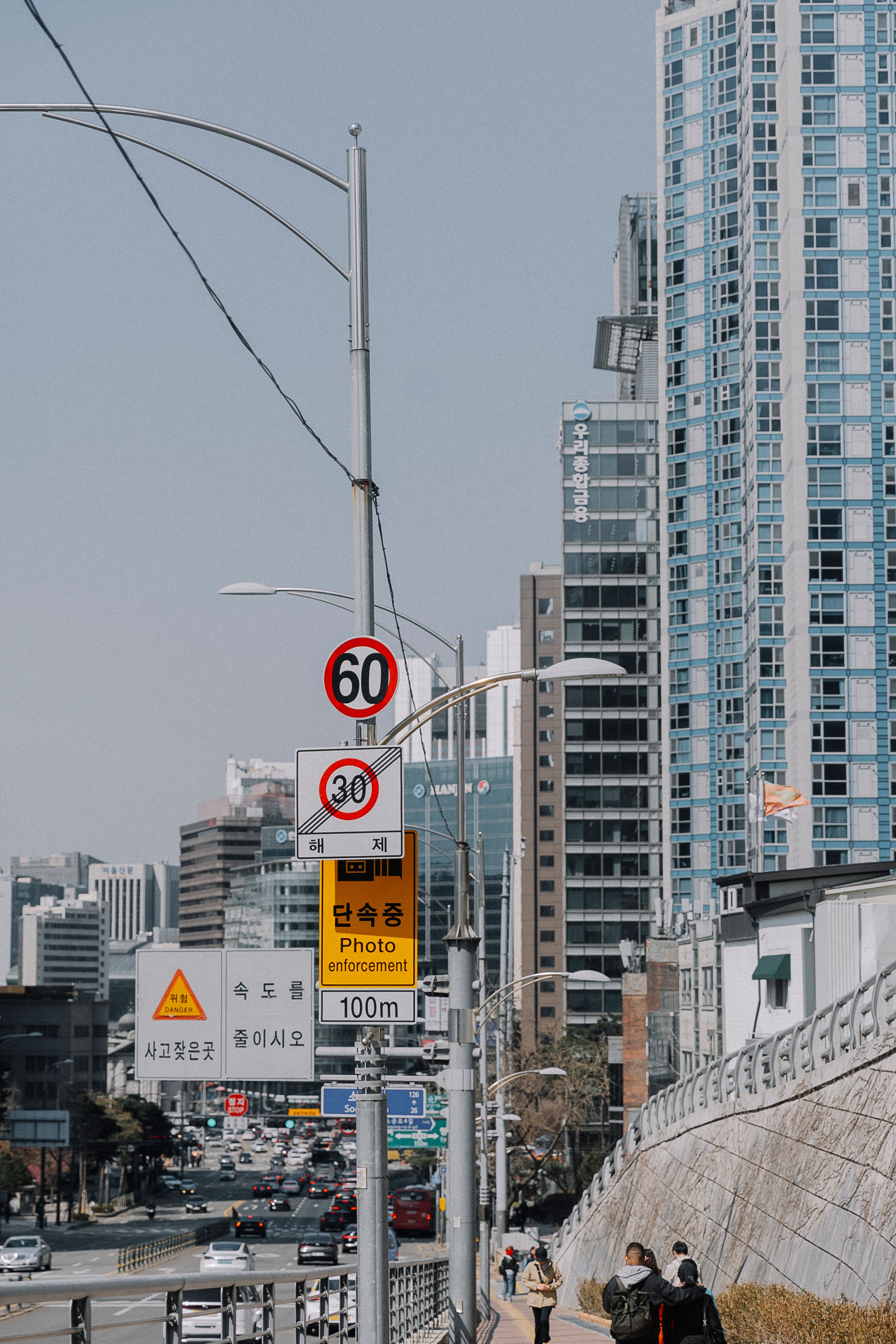 Road Signs and Residential Buildings over Street in Seoul · Free Stock ...