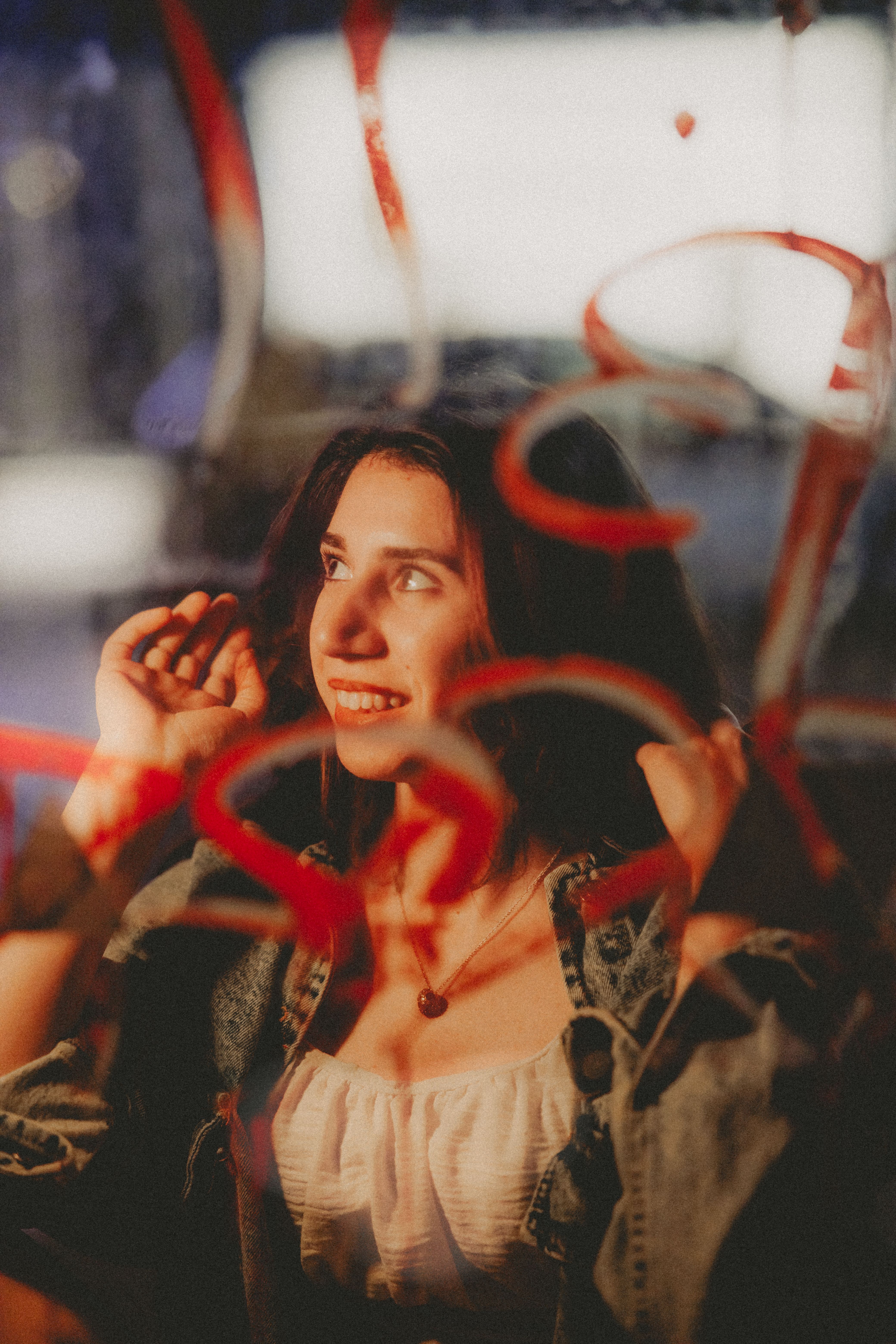 Smiling Woman behind Window · Free Stock Photo