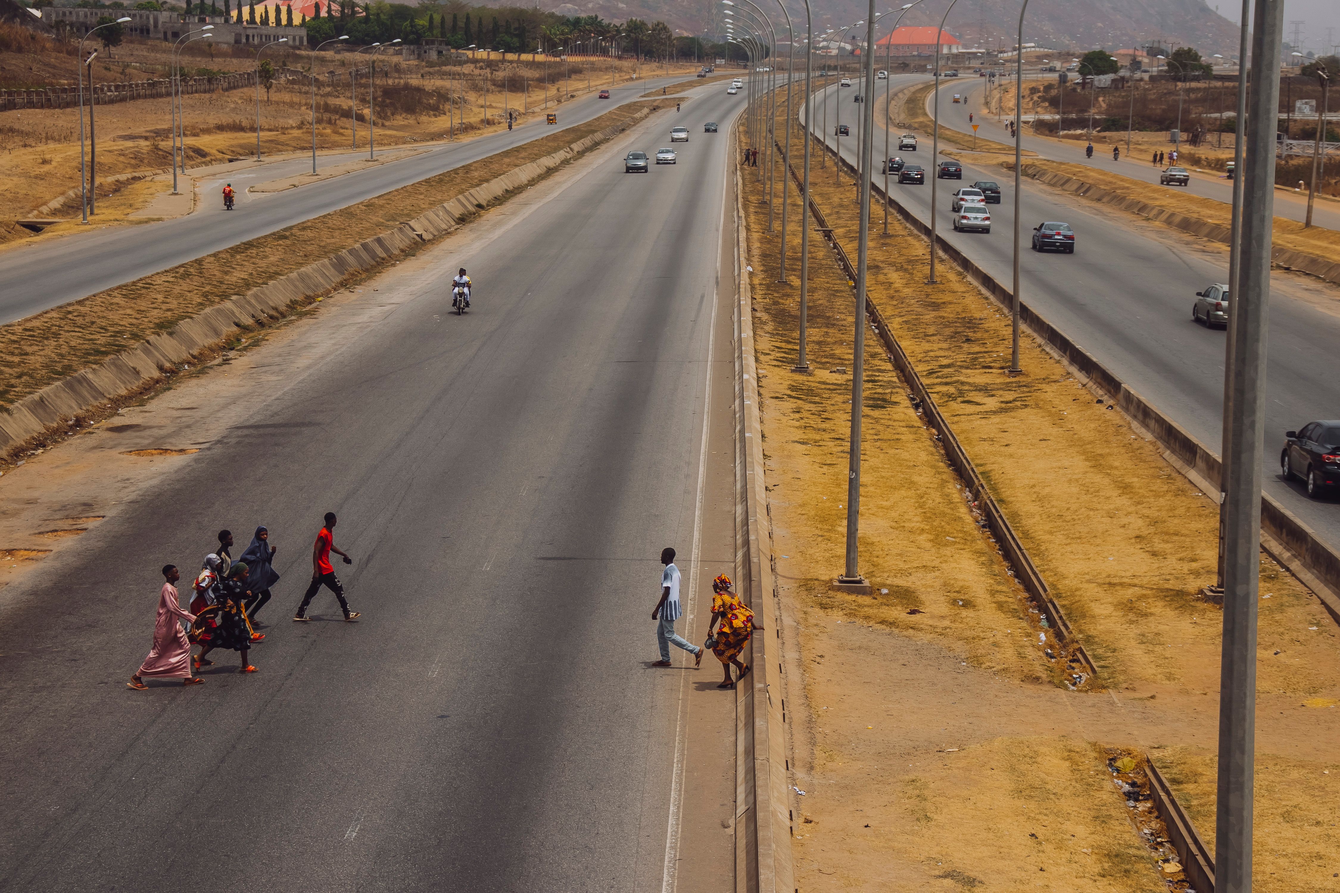 People Crossing Highway in Nigeria · Free Stock Photo