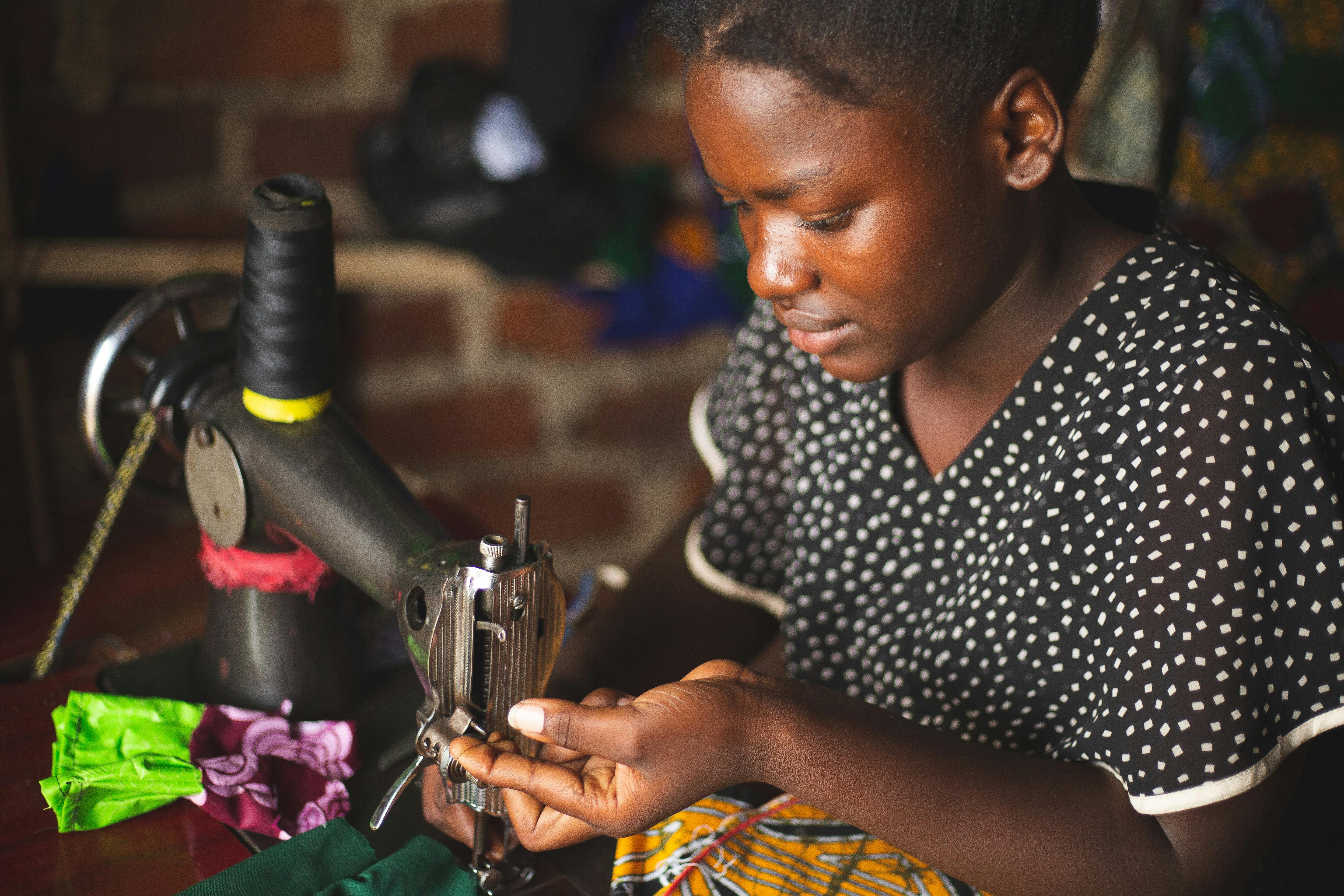 Close-up of a Young Girl Sewing · Free Stock Photo