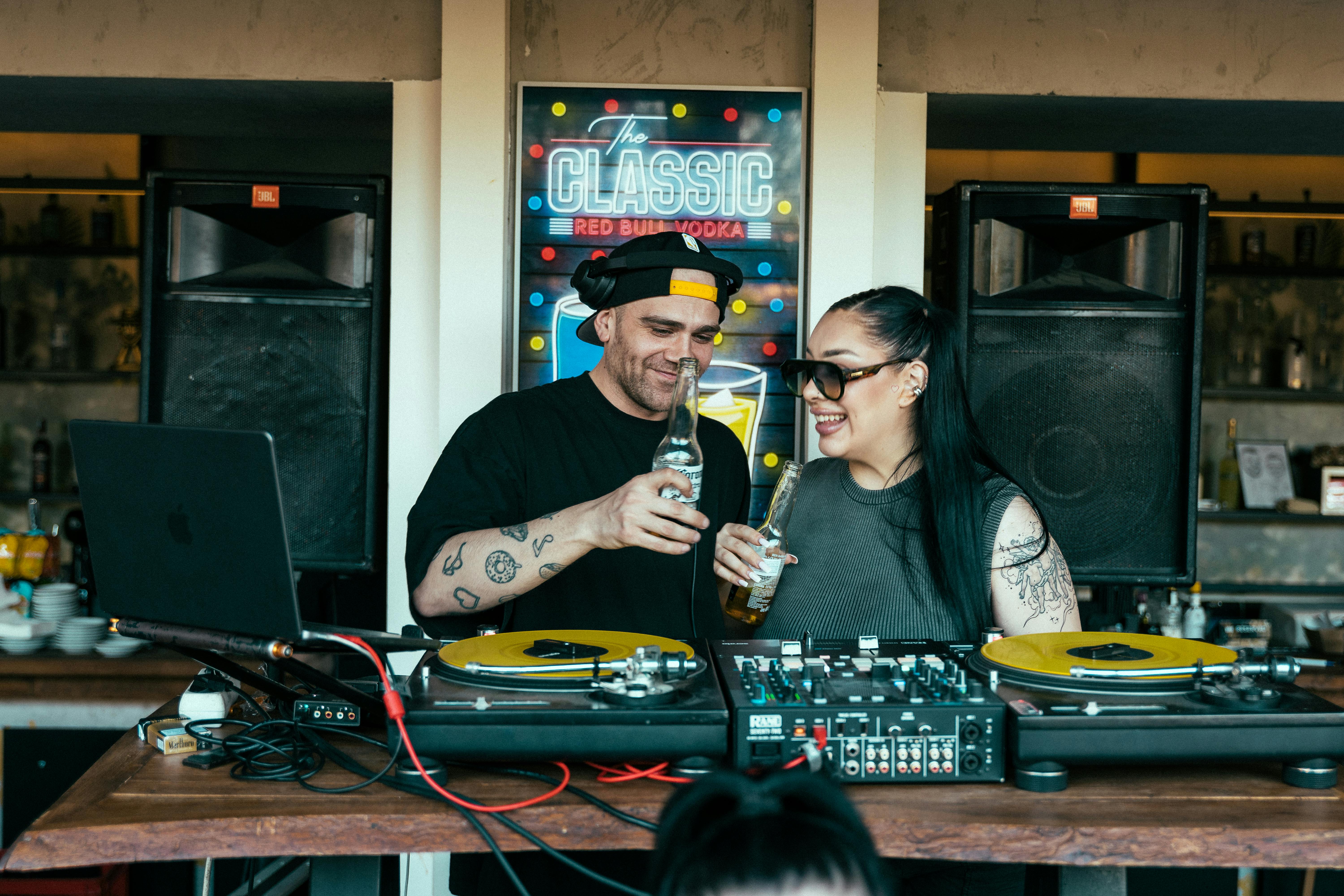 Smiling DJs with Beer at Party · Free Stock Photo