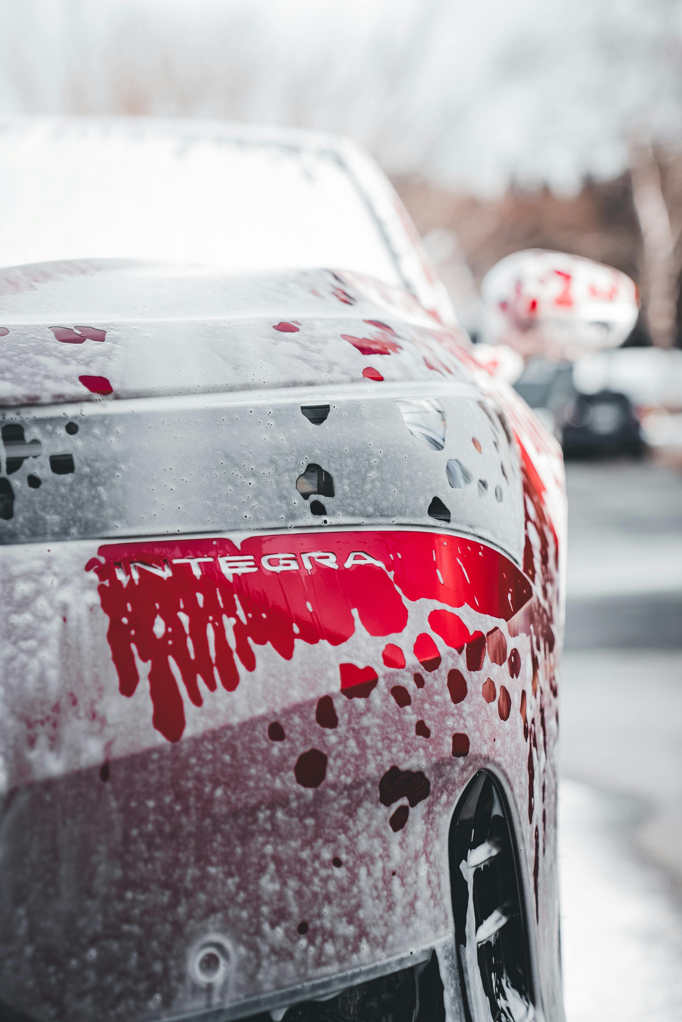 Foam-Covered Back of a Red Acura Integra Car · Free Stock Photo