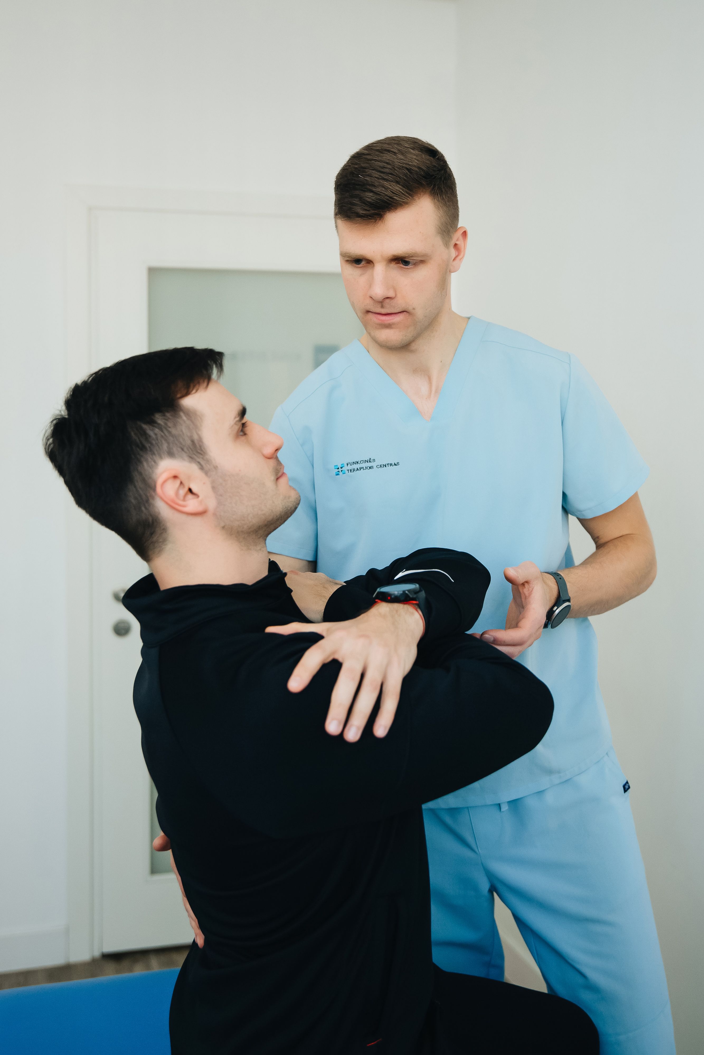 Man Exercising with Physiotherapist · Free Stock Photo
