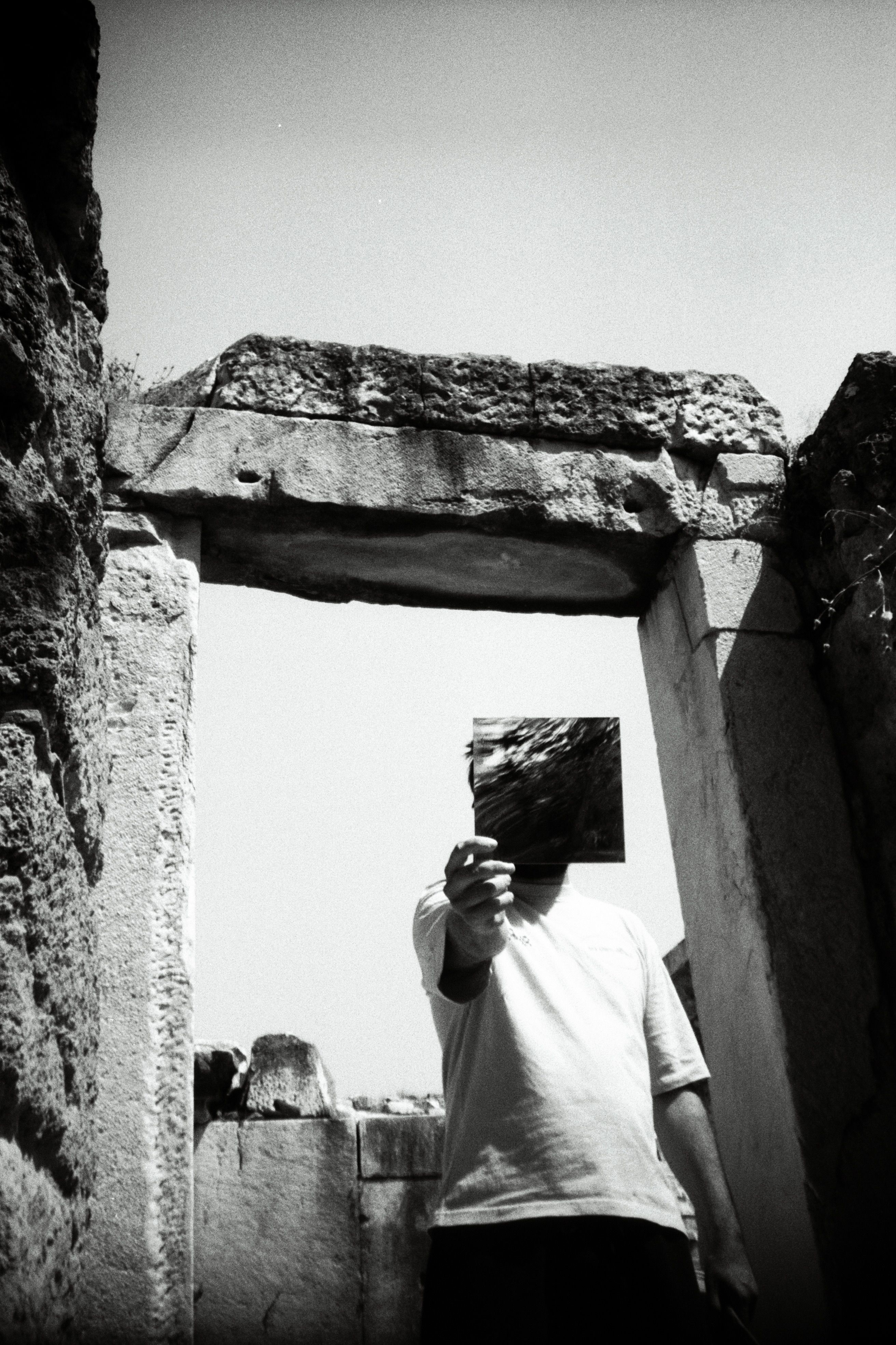 Photographer Capturing Inside Ruins · Free Stock Photo
