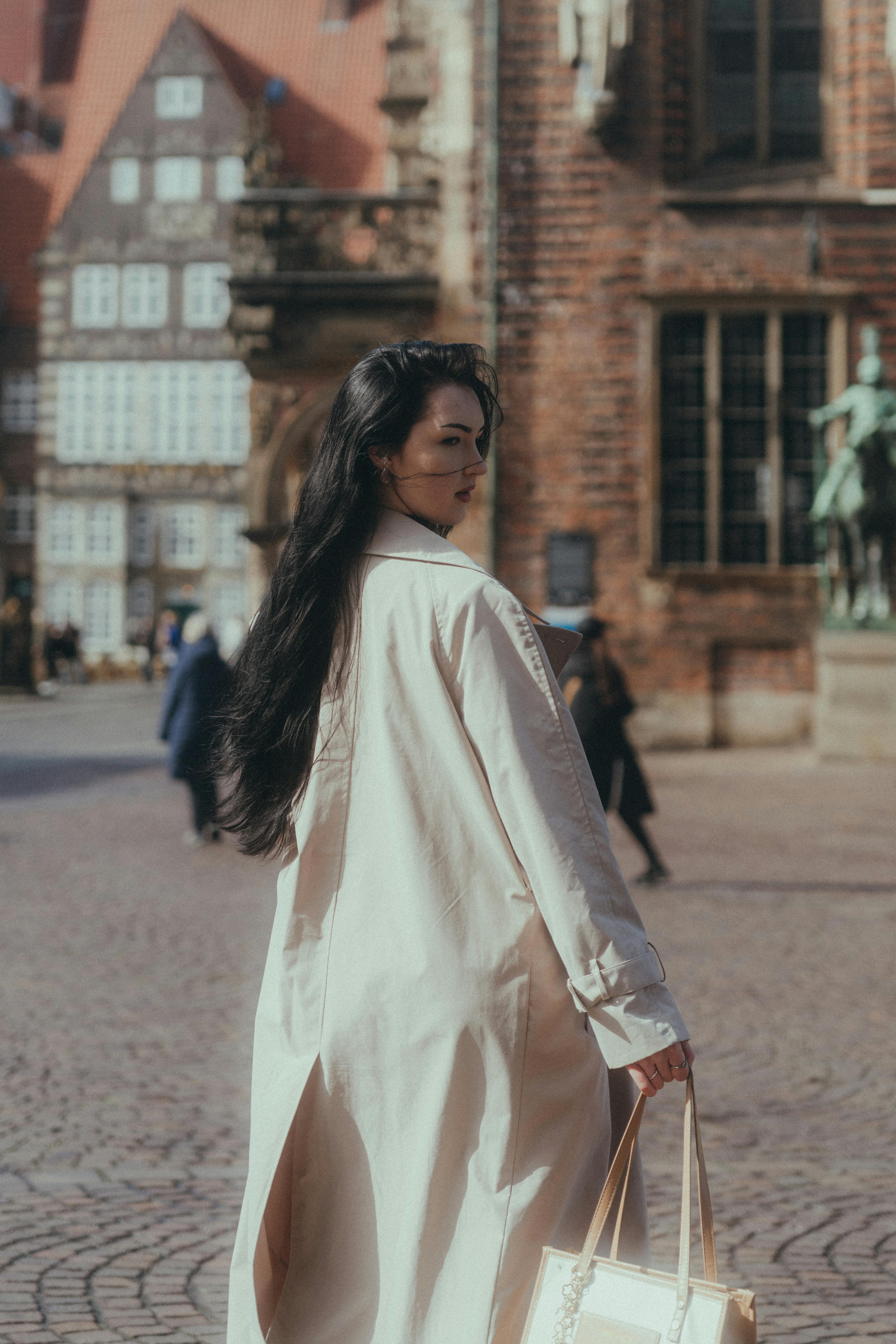 Back View of Woman in Trench Coat on Street in City · Free Stock Photo