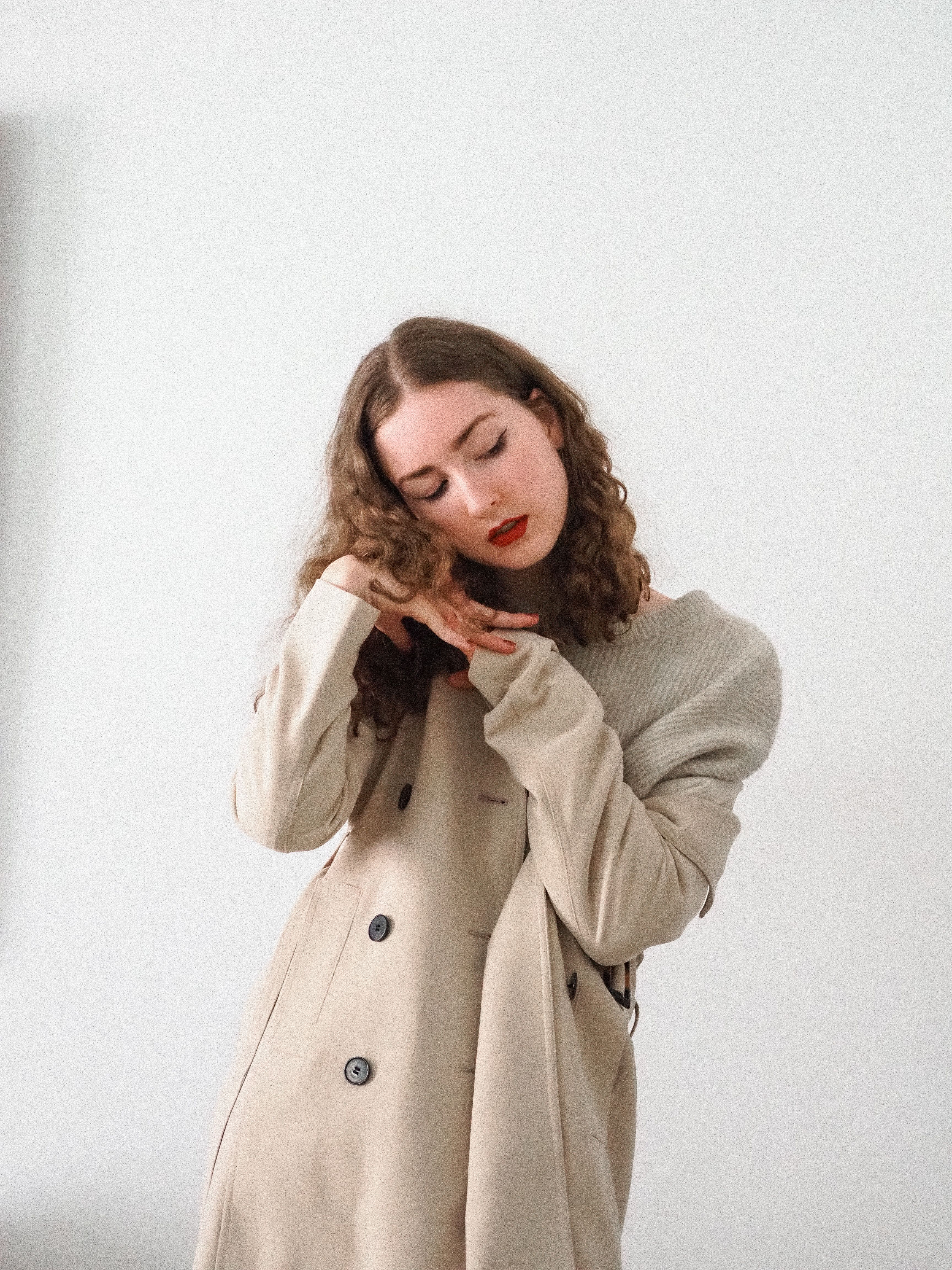 Model Posing in a Coat · Free Stock Photo