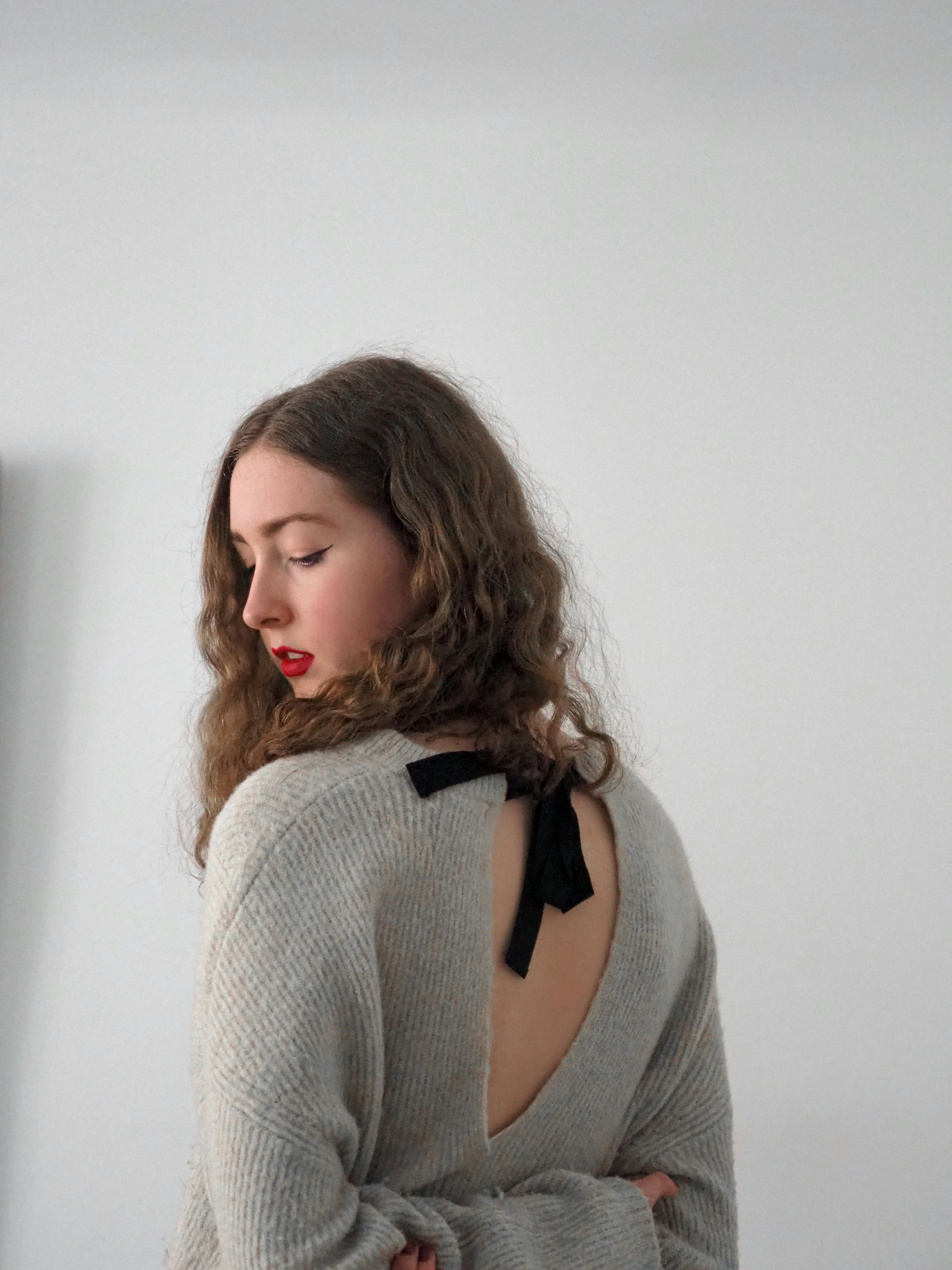Back View of Woman in Sweater · Free Stock Photo