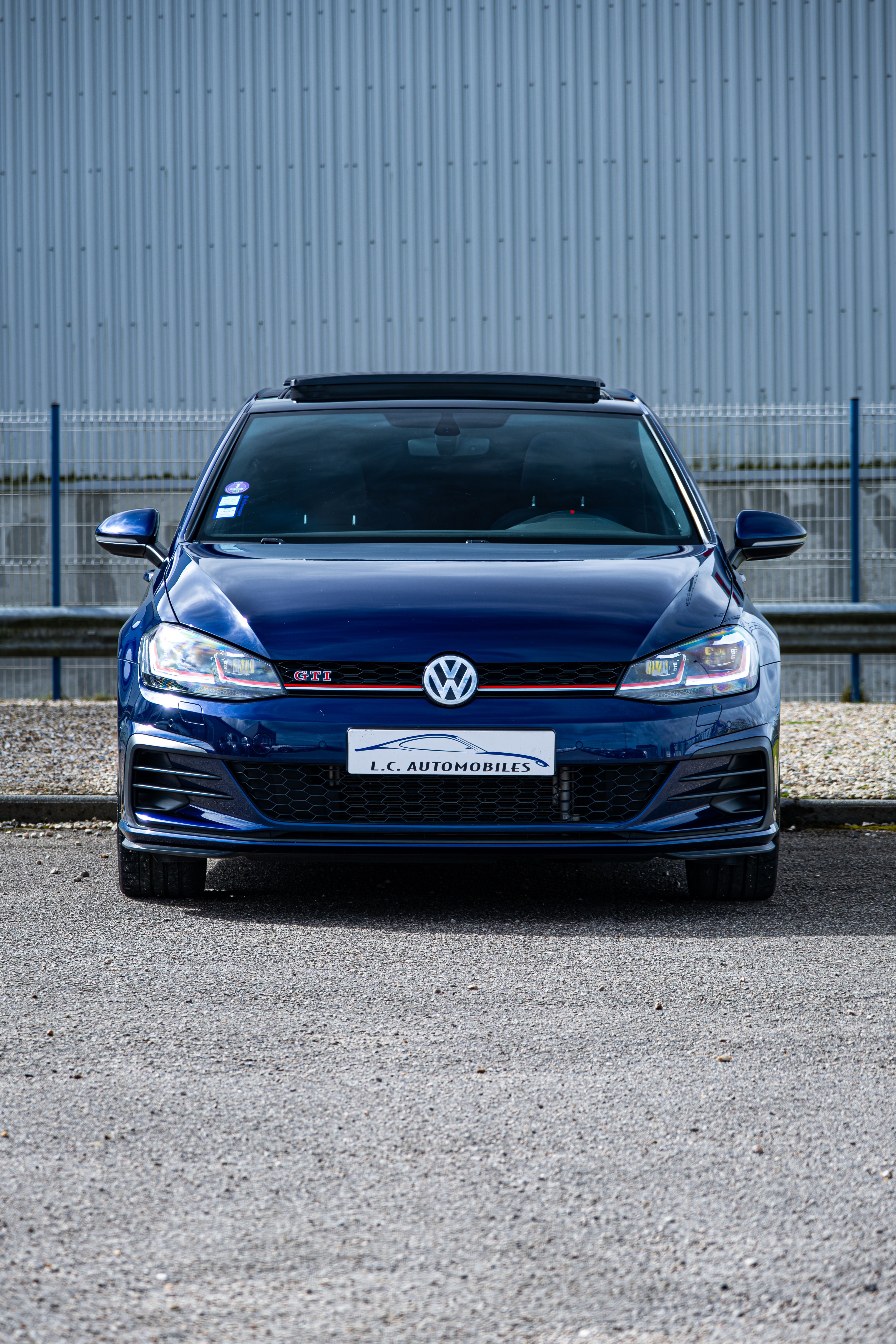 View of a Parked Volkswagen Golf VII GTI · Free Stock Photo
