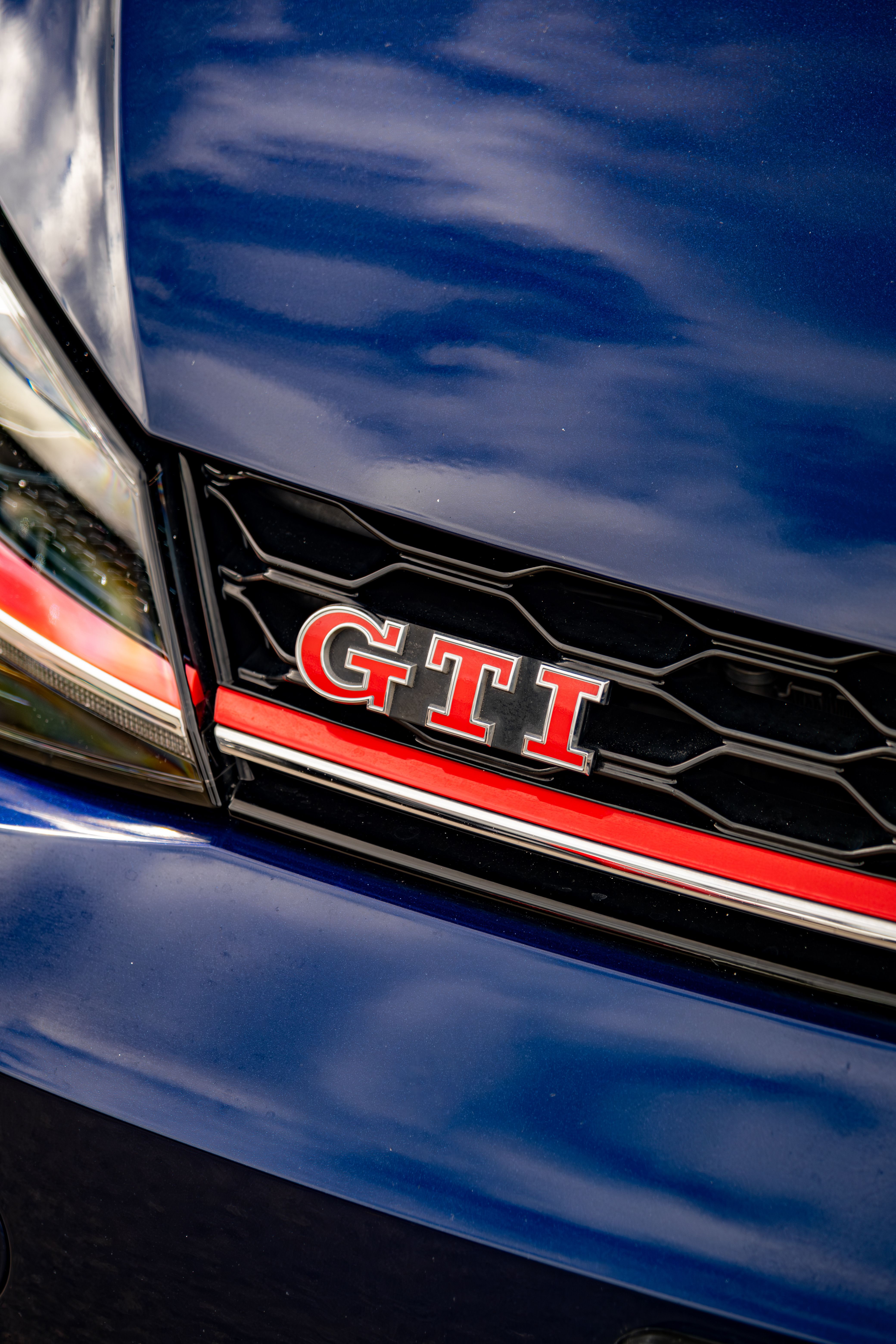 Close-up of a GTI Word Engraved on a Front of the Volkswagen Car · Free ...