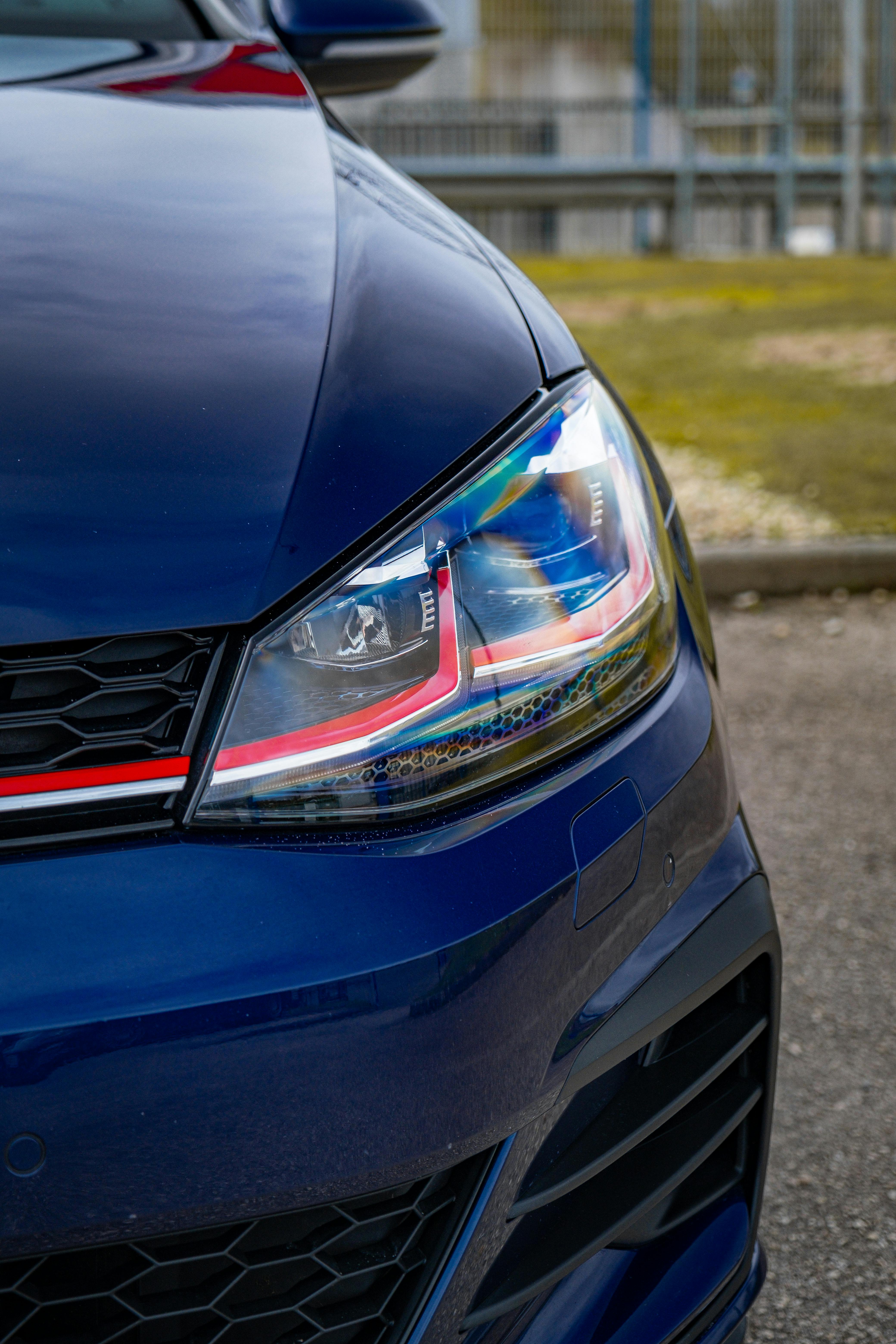 Headlight of Blue Volkswagen Golf GTI · Free Stock Photo