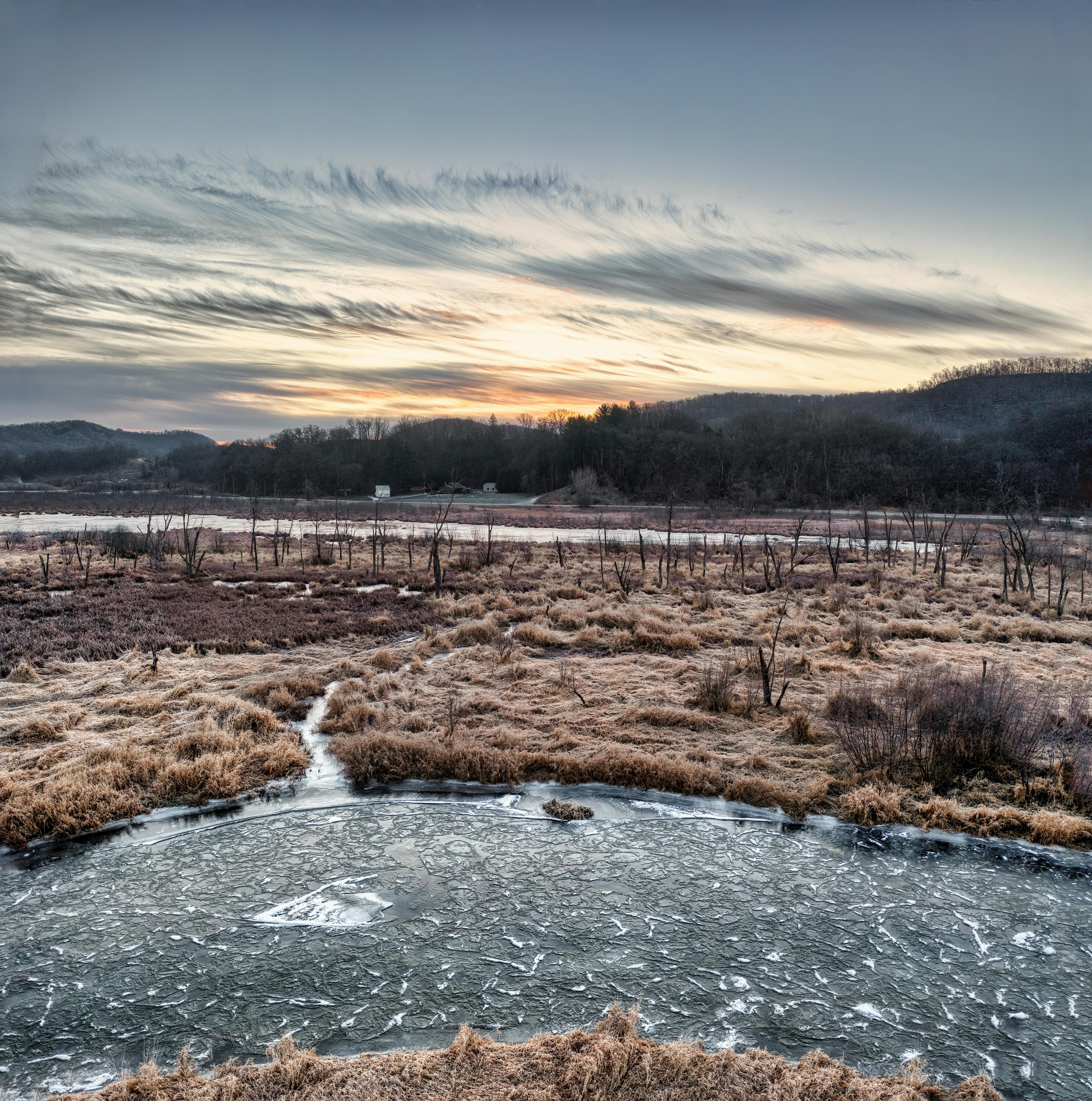Frozen River in Countryside at Sunset · Free Stock Photo