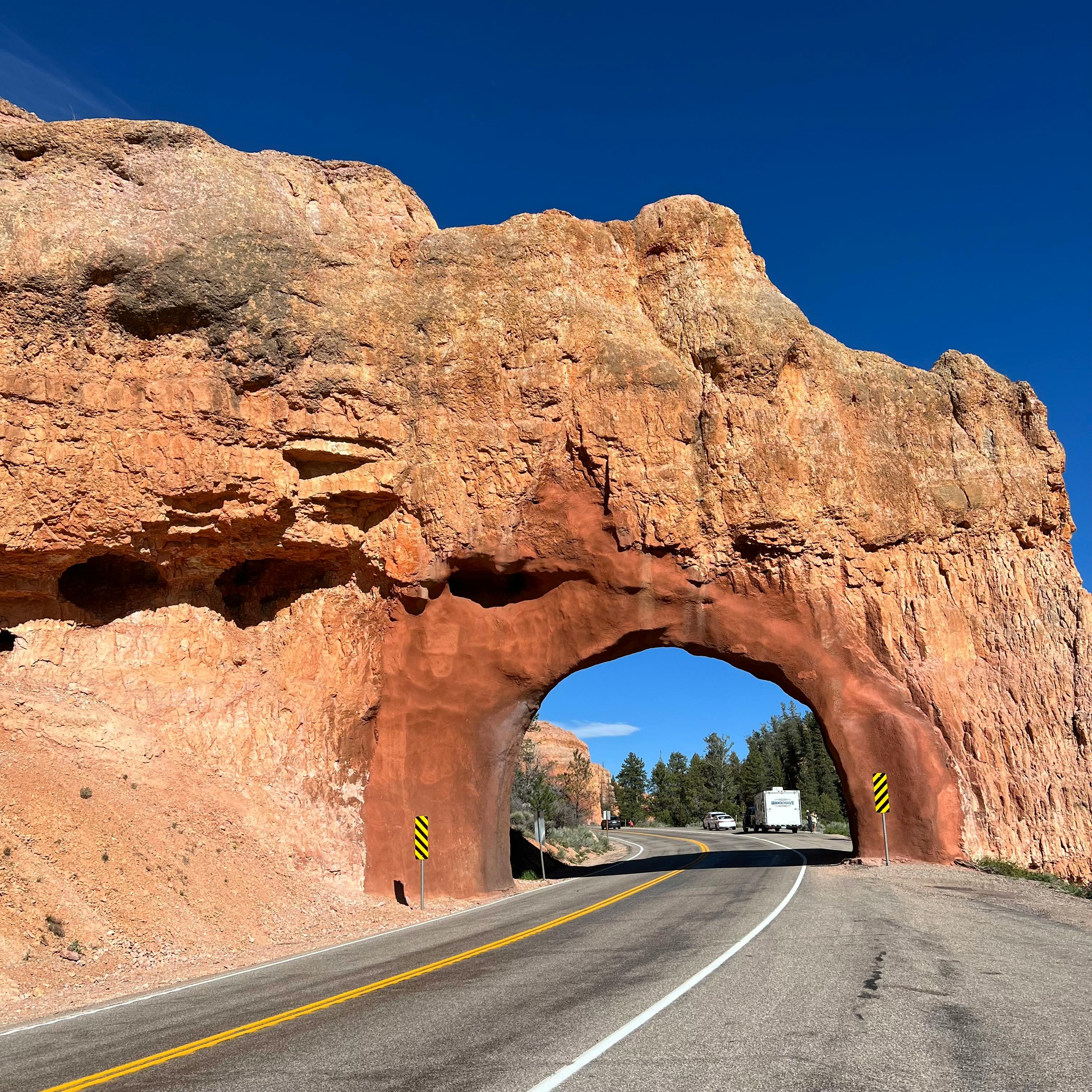 Natural Arch over Road · Free Stock Photo