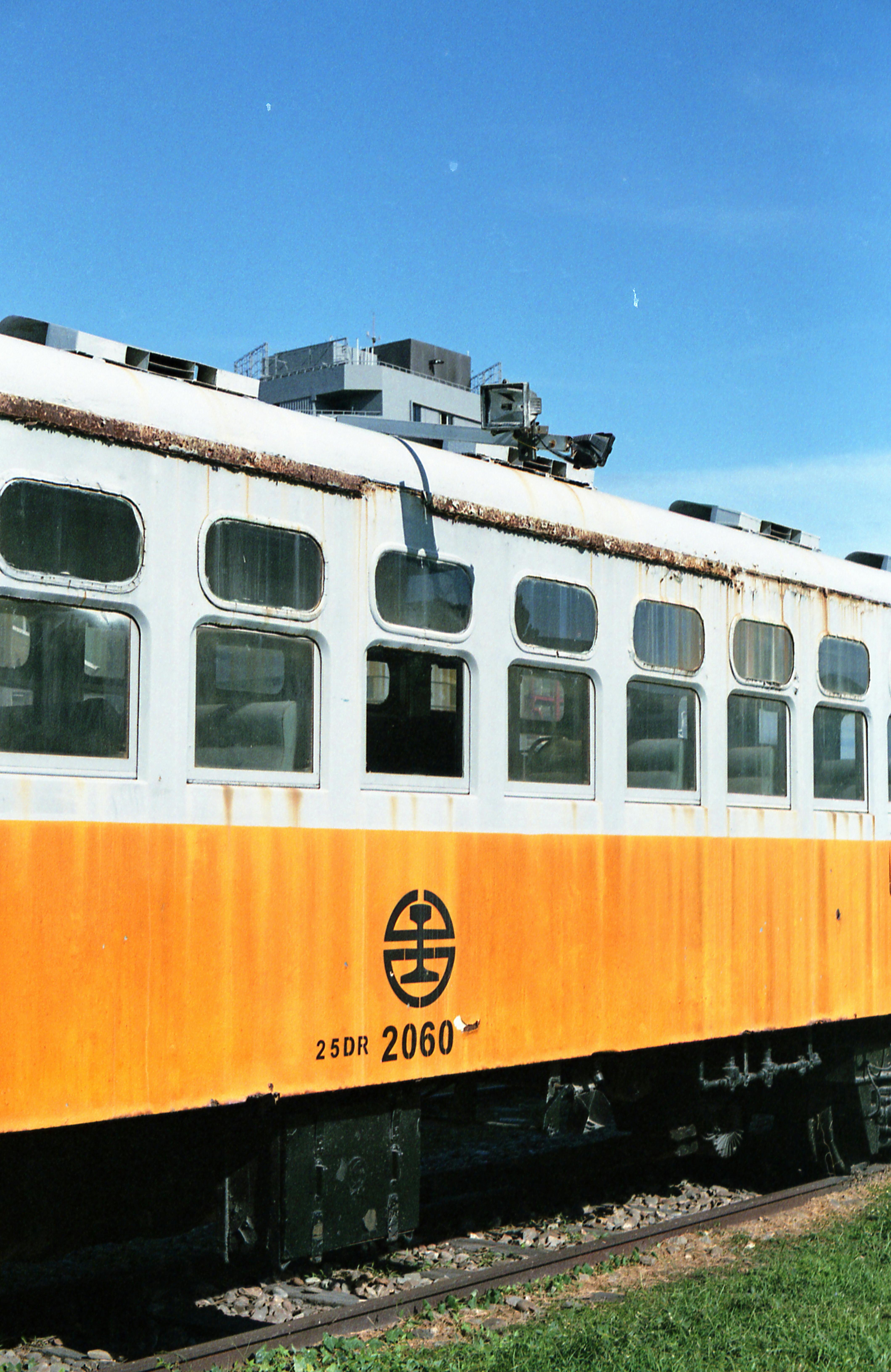 Exterior of a White and Yellow Passenger Train Wagon · Free Stock Photo