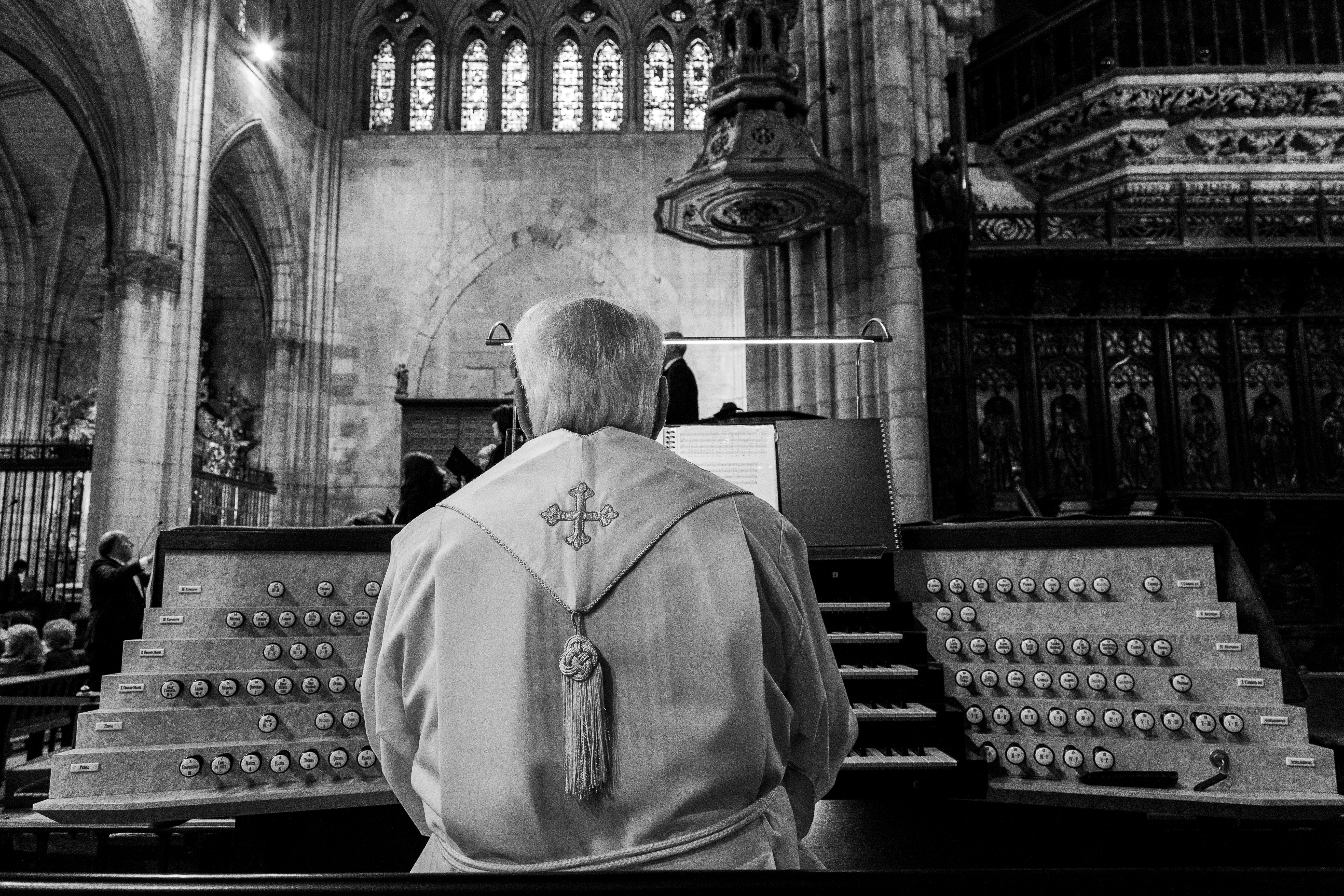 Back View of Elderly Priest Sitting at Church · Free Stock Photo