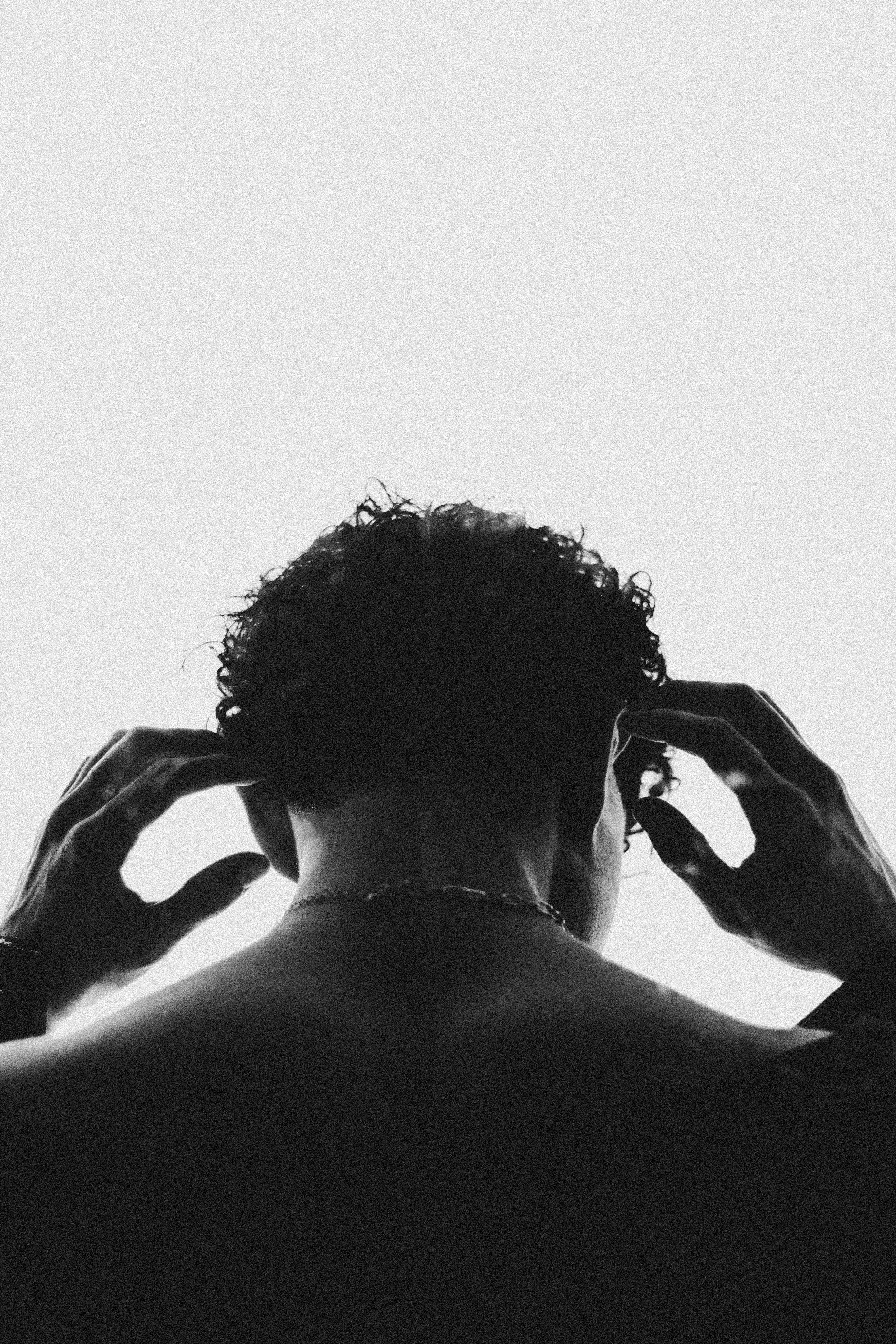 Man Touching his Head · Free Stock Photo