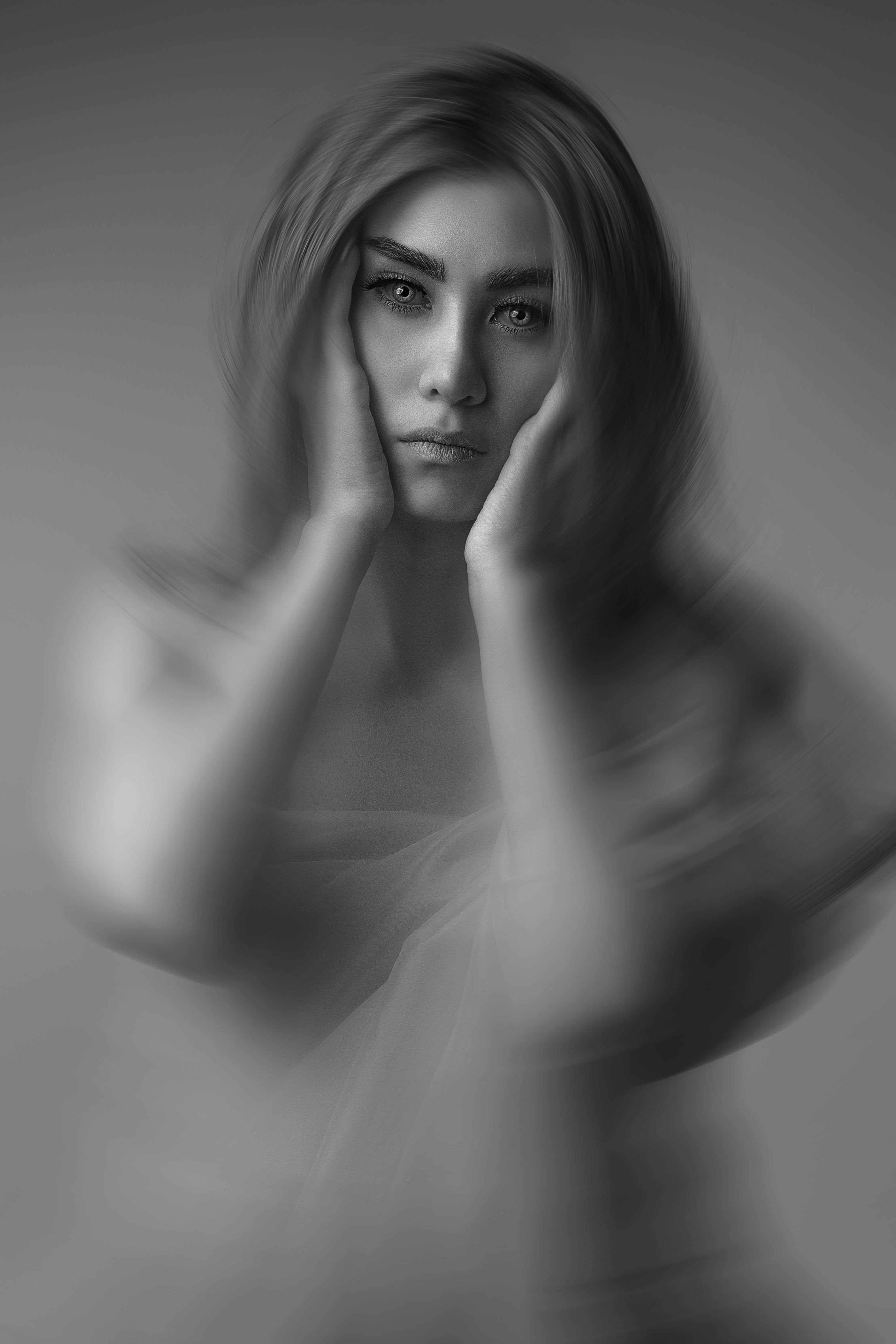 Woman with Hands on Face Fading Away · Free Stock Photo