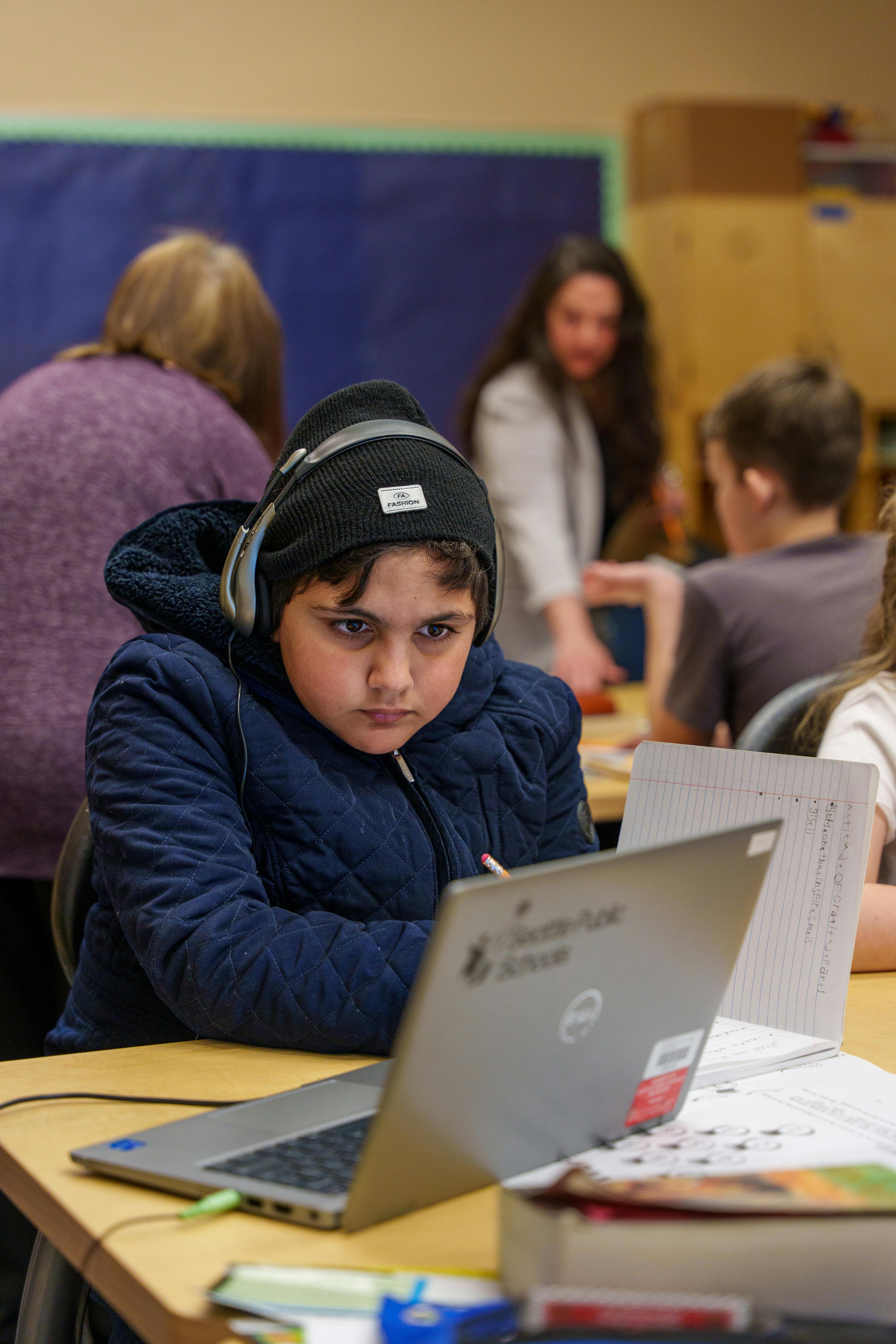 Boy Working on Laptop · Free Stock Photo