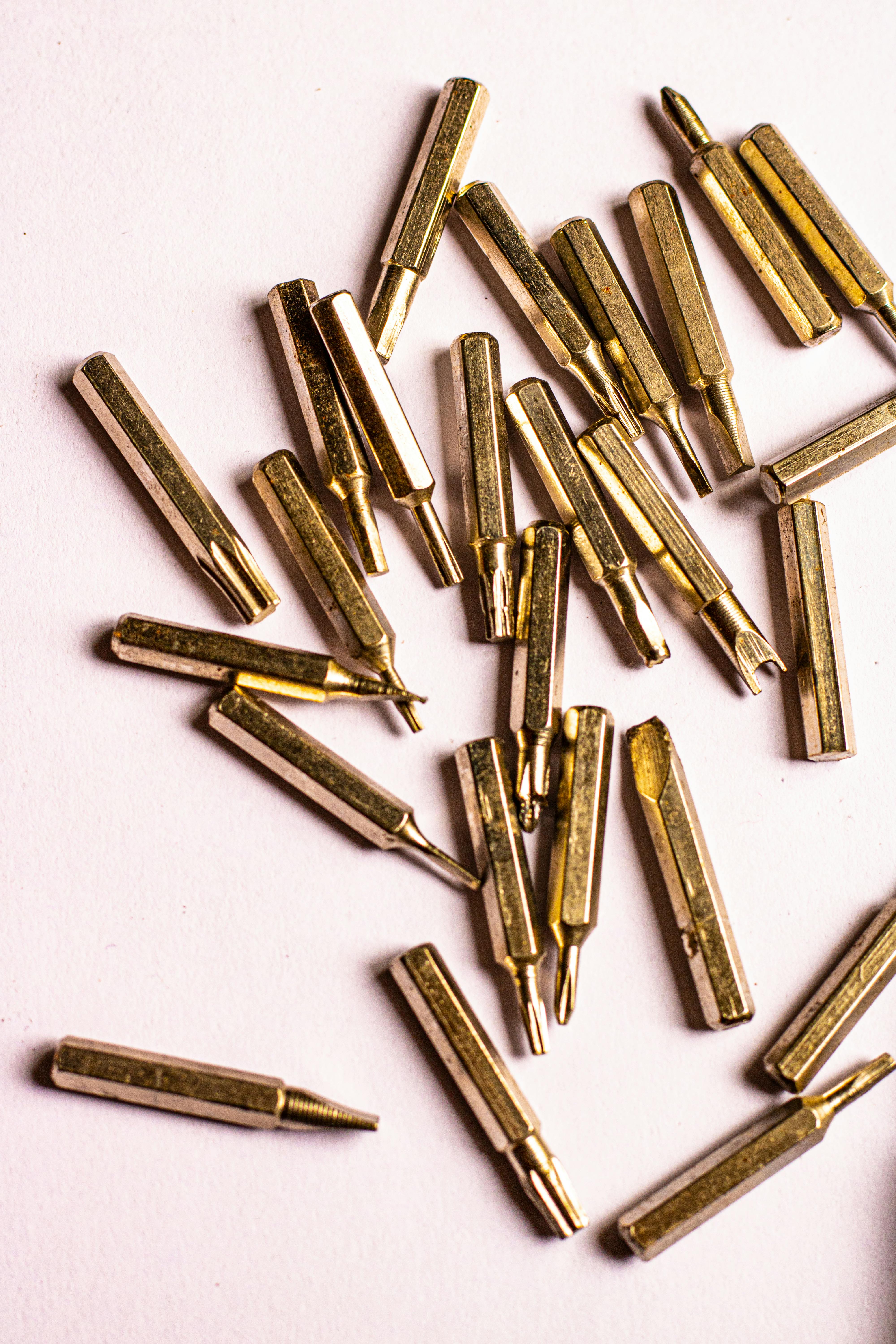 Golden Bullets on a Table · Free Stock Photo