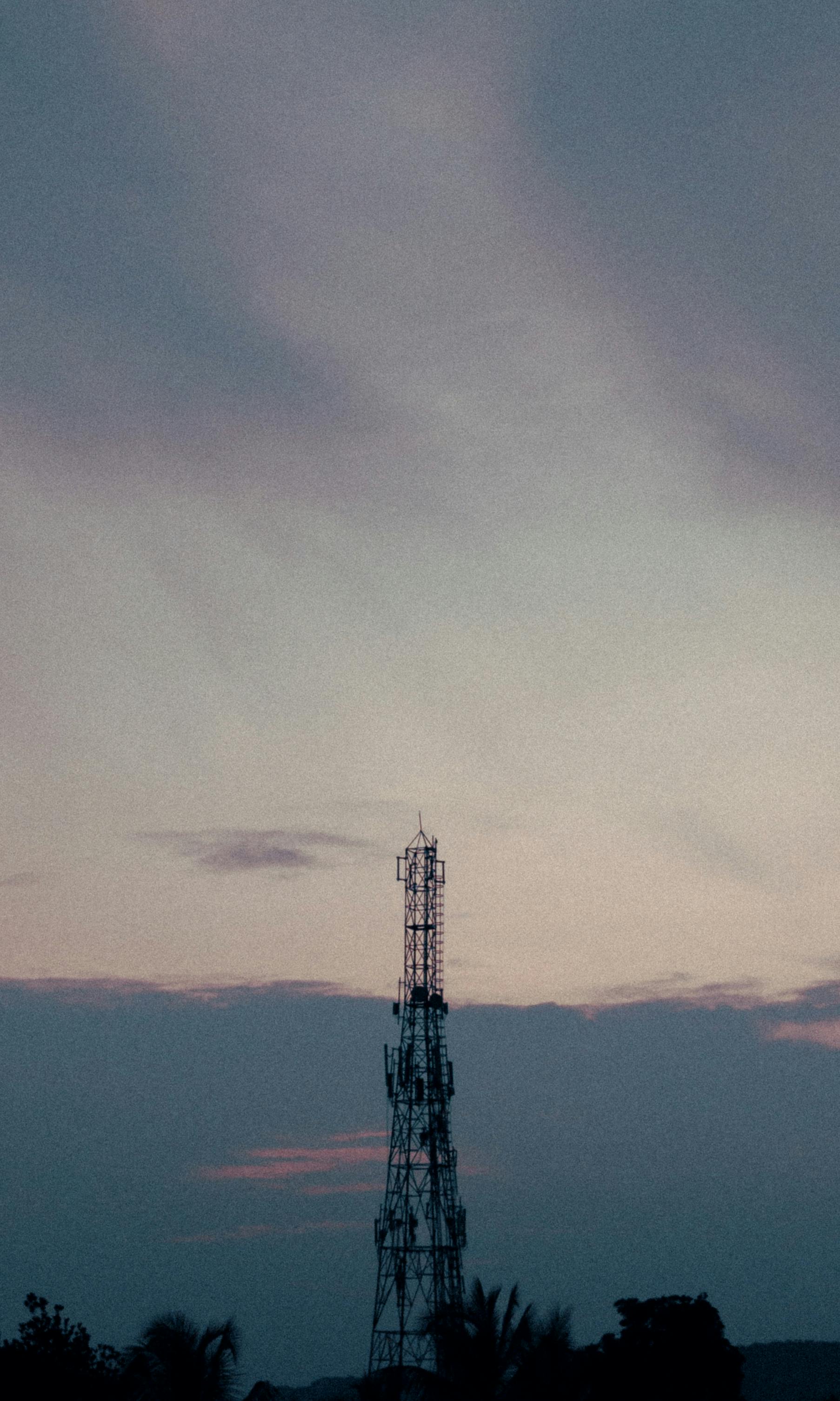 Radio Tower in a Valley in Shadow · Free Stock Photo