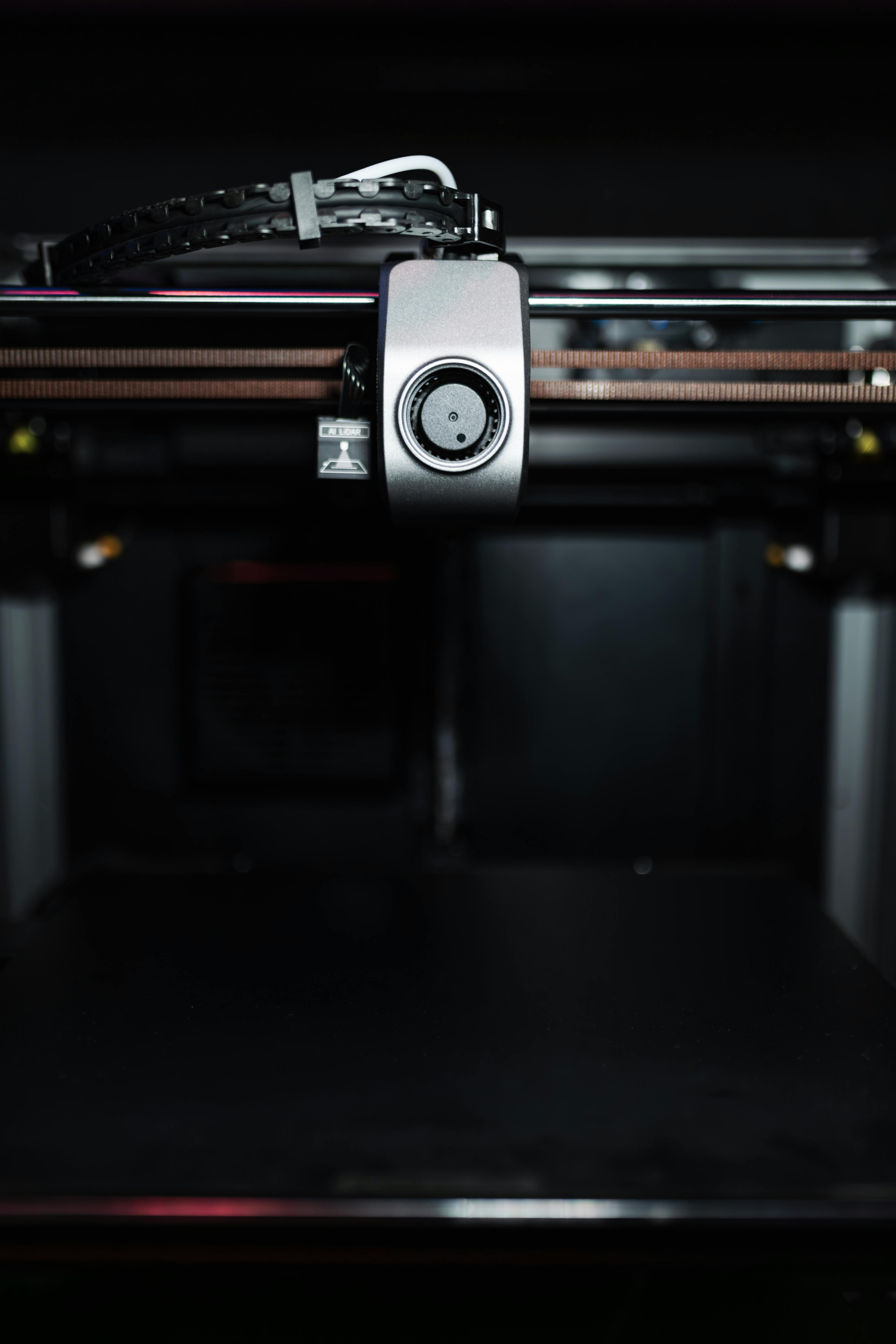 Photo of a 3D Printer Printing a Vase · Free Stock Photo