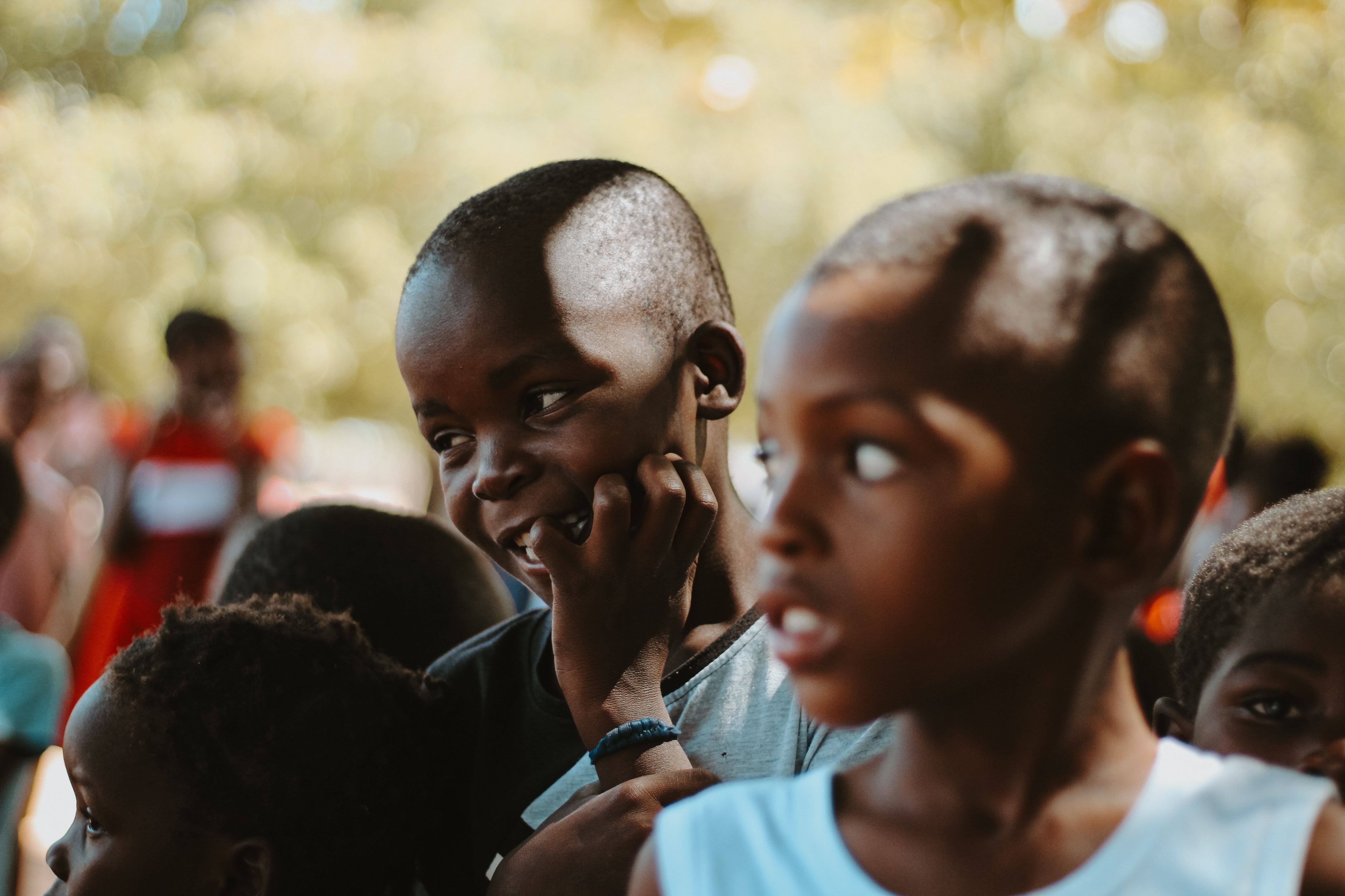 A group of children are looking at each other · Free Stock Photo