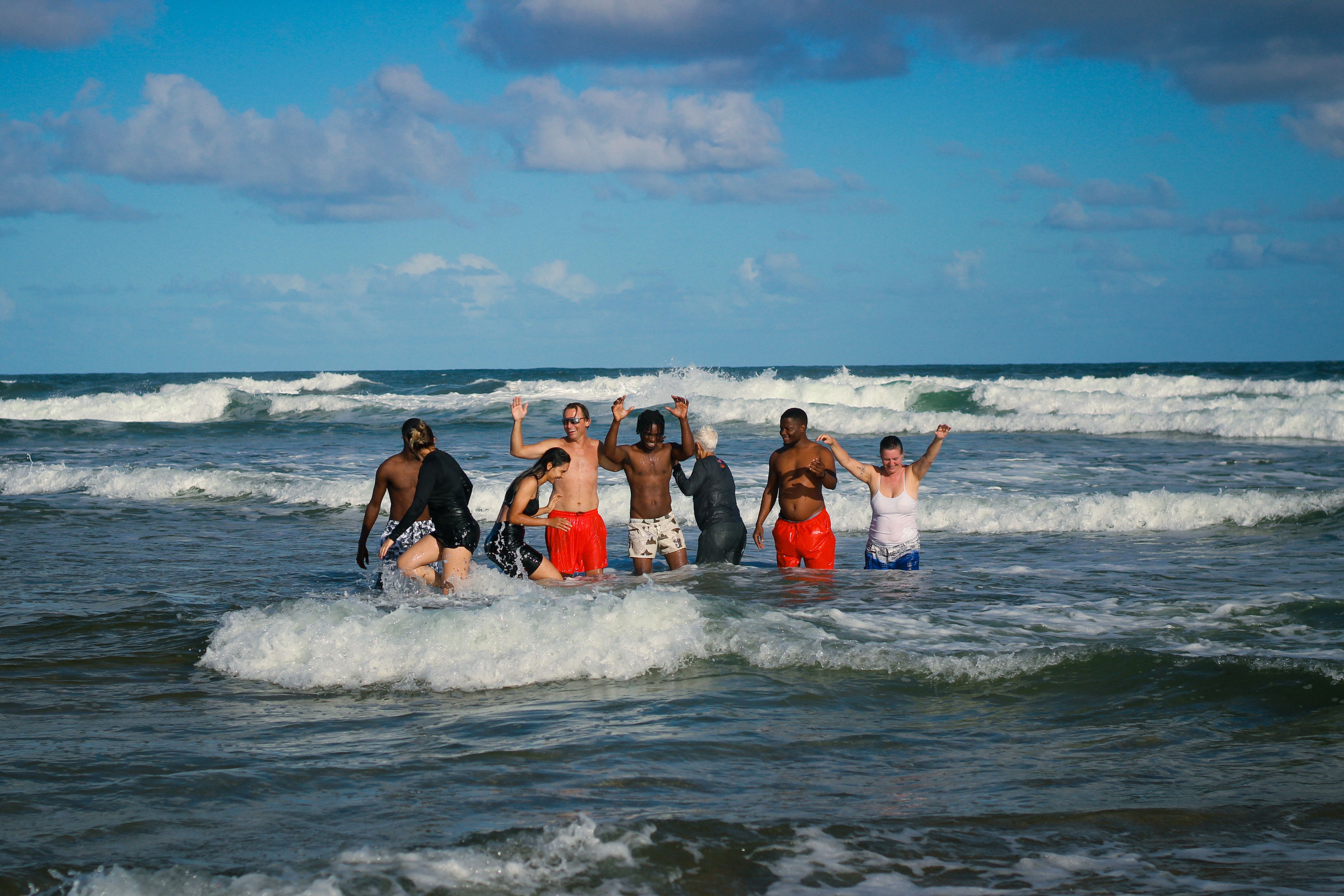 Group of Friends Standing in the Sea · Free Stock Photo