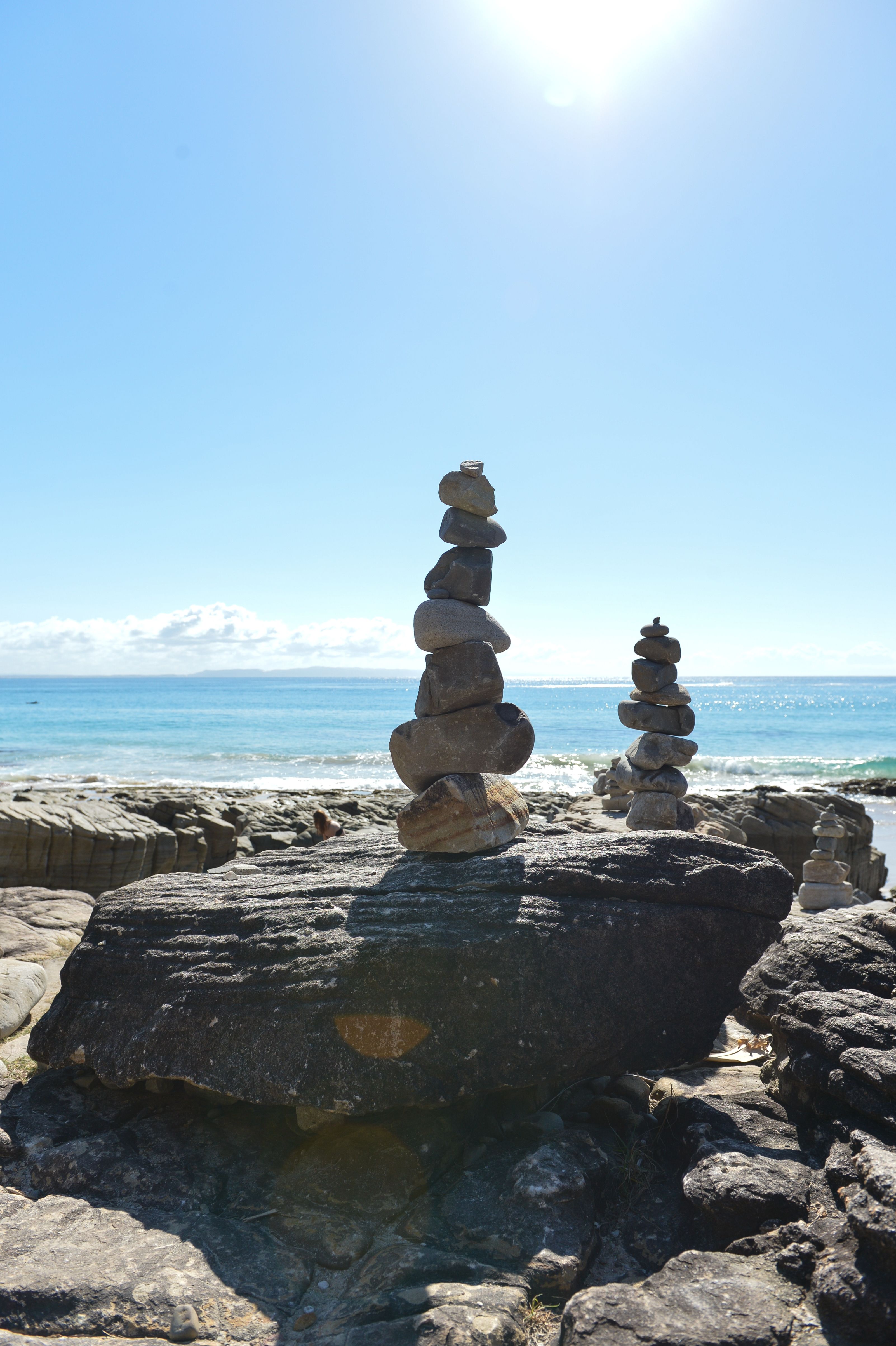 Stacks of Stones on a Seaside Rock · Free Stock Photo