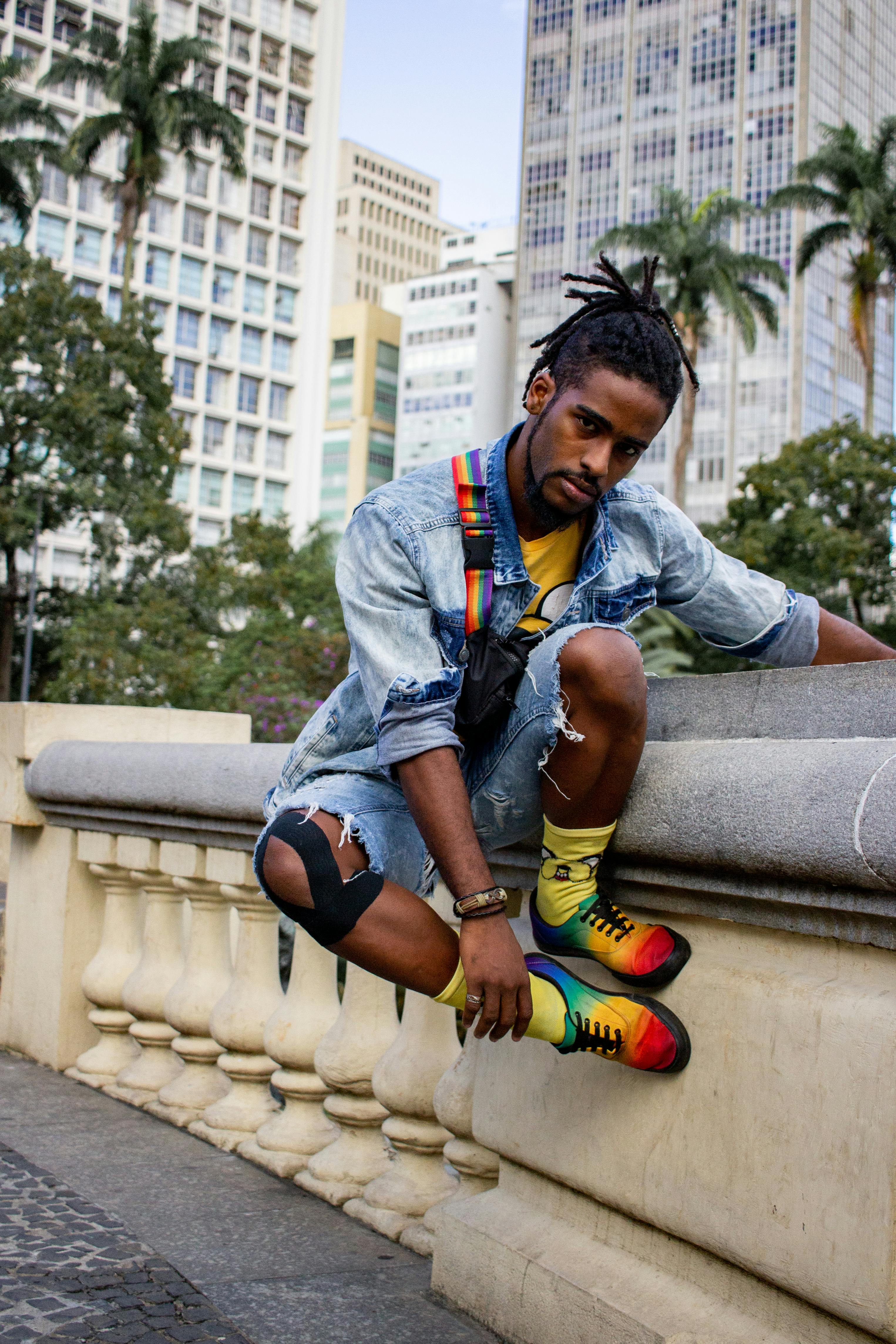Man on Concrete Wall · Free Stock Photo