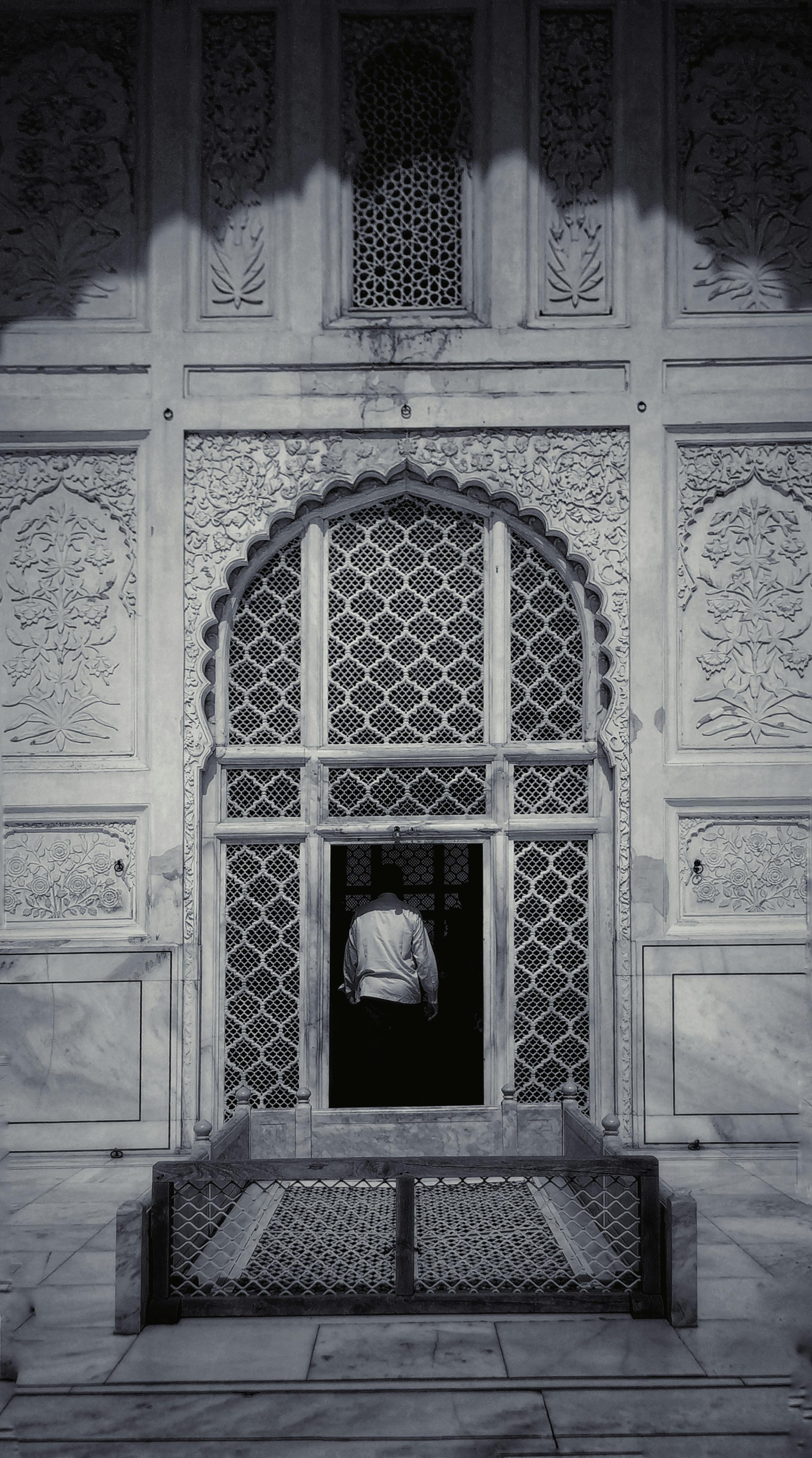 A Person Entering a Building · Free Stock Photo