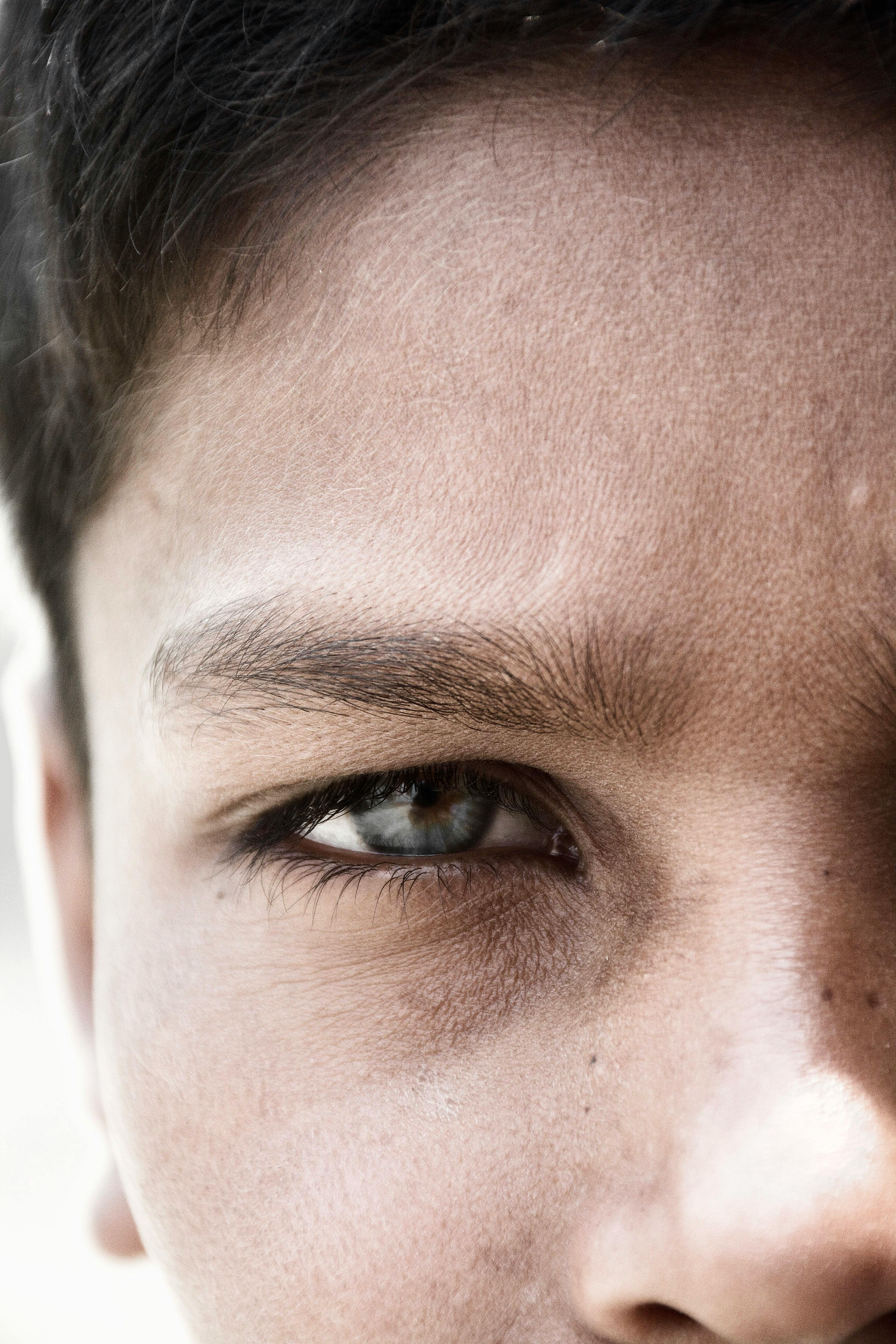 A close up of a young man's face · Free Stock Photo