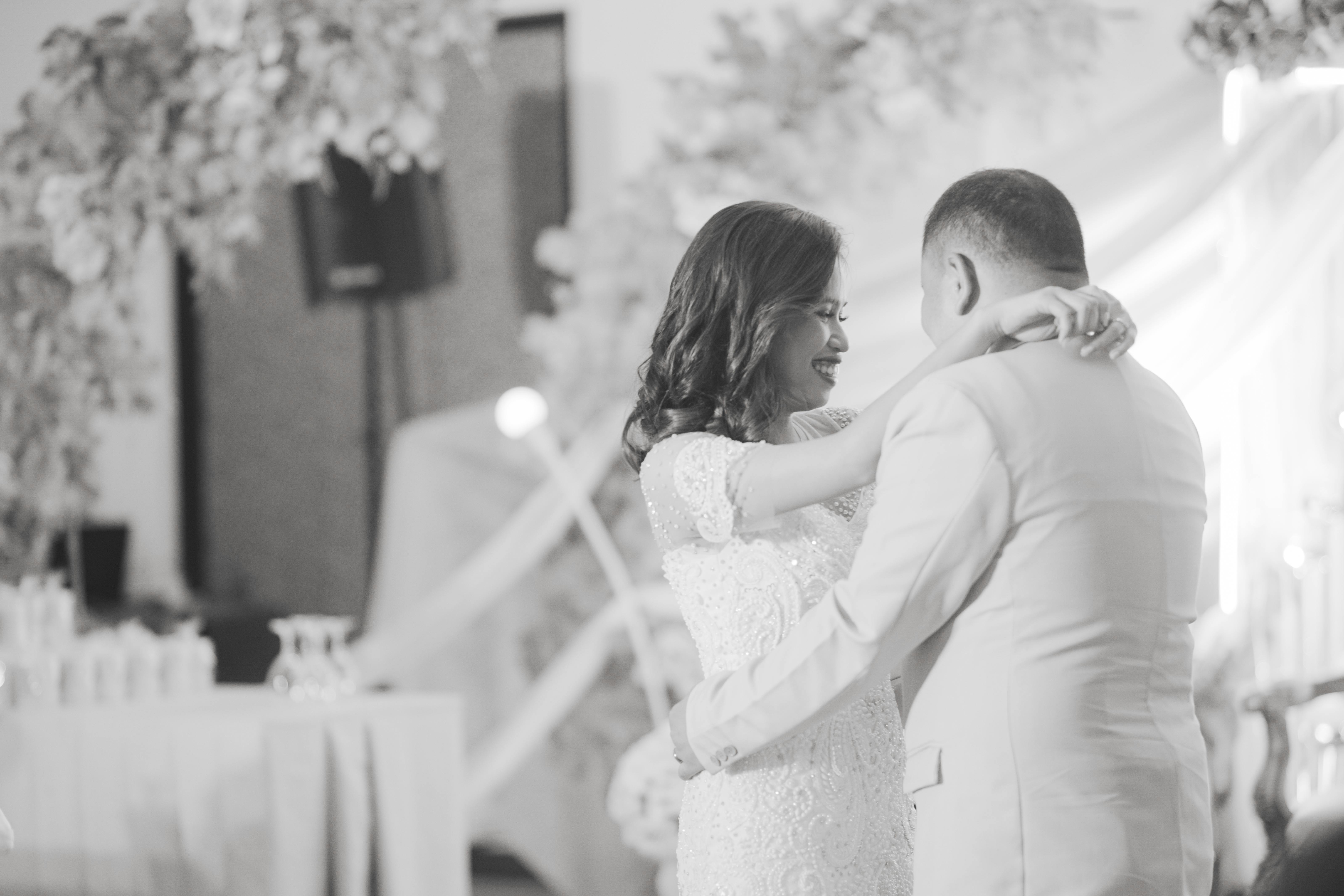 Happy Bride Dancing with Groom · Free Stock Photo