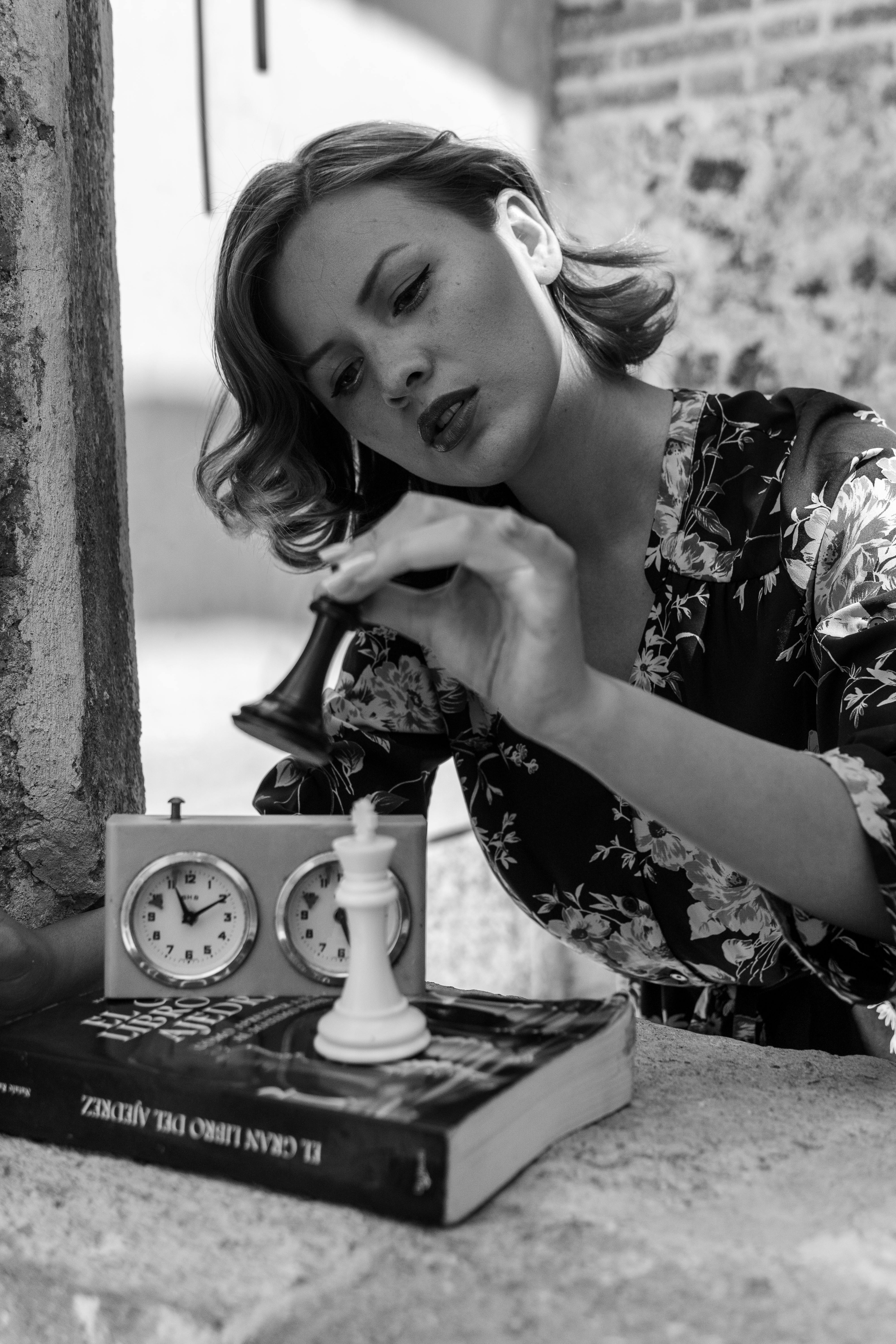 Woman in Black Dress Playing Chess · Free Stock Photo