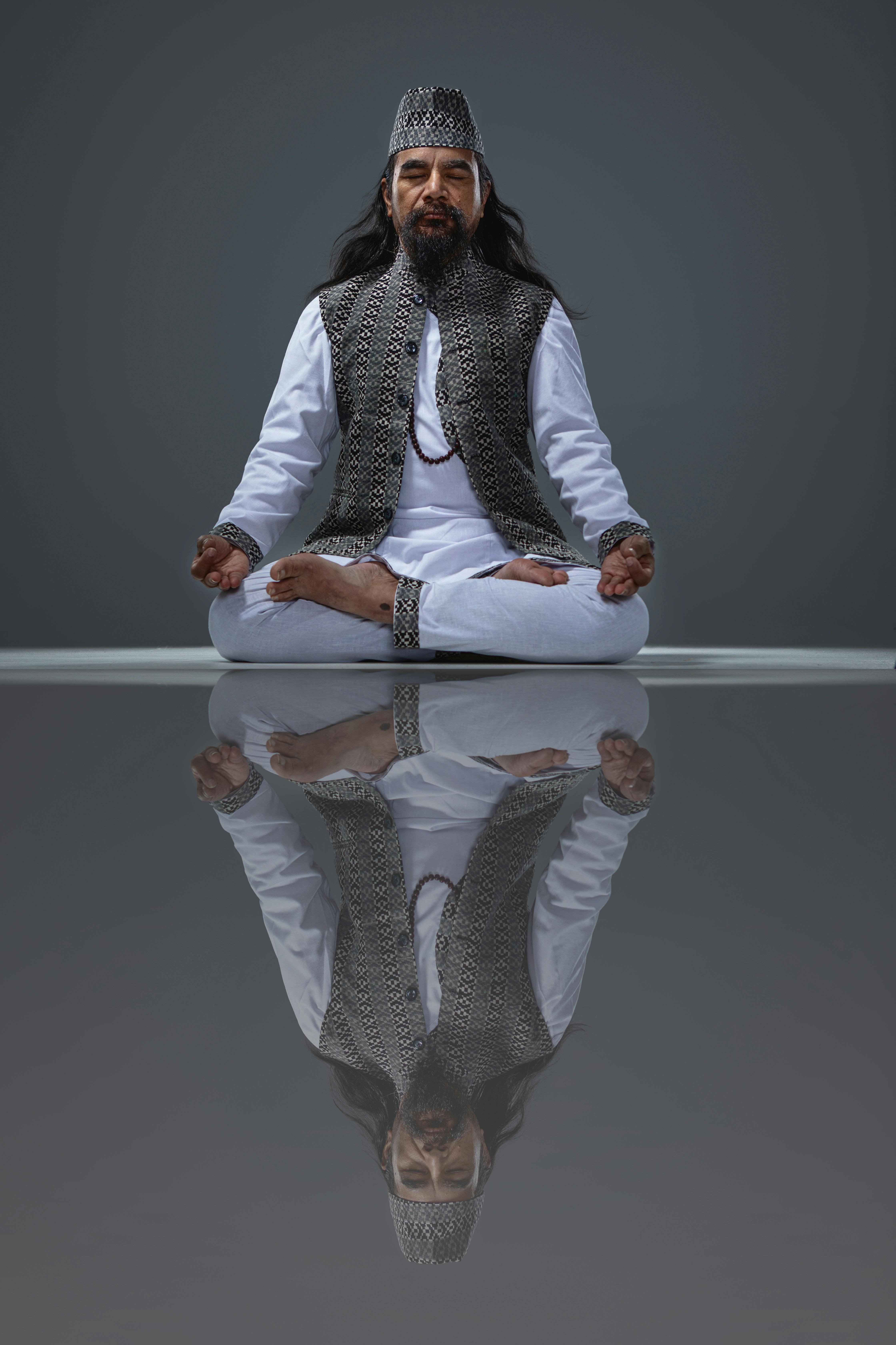 Man Meditating on the Water Surface · Free Stock Photo