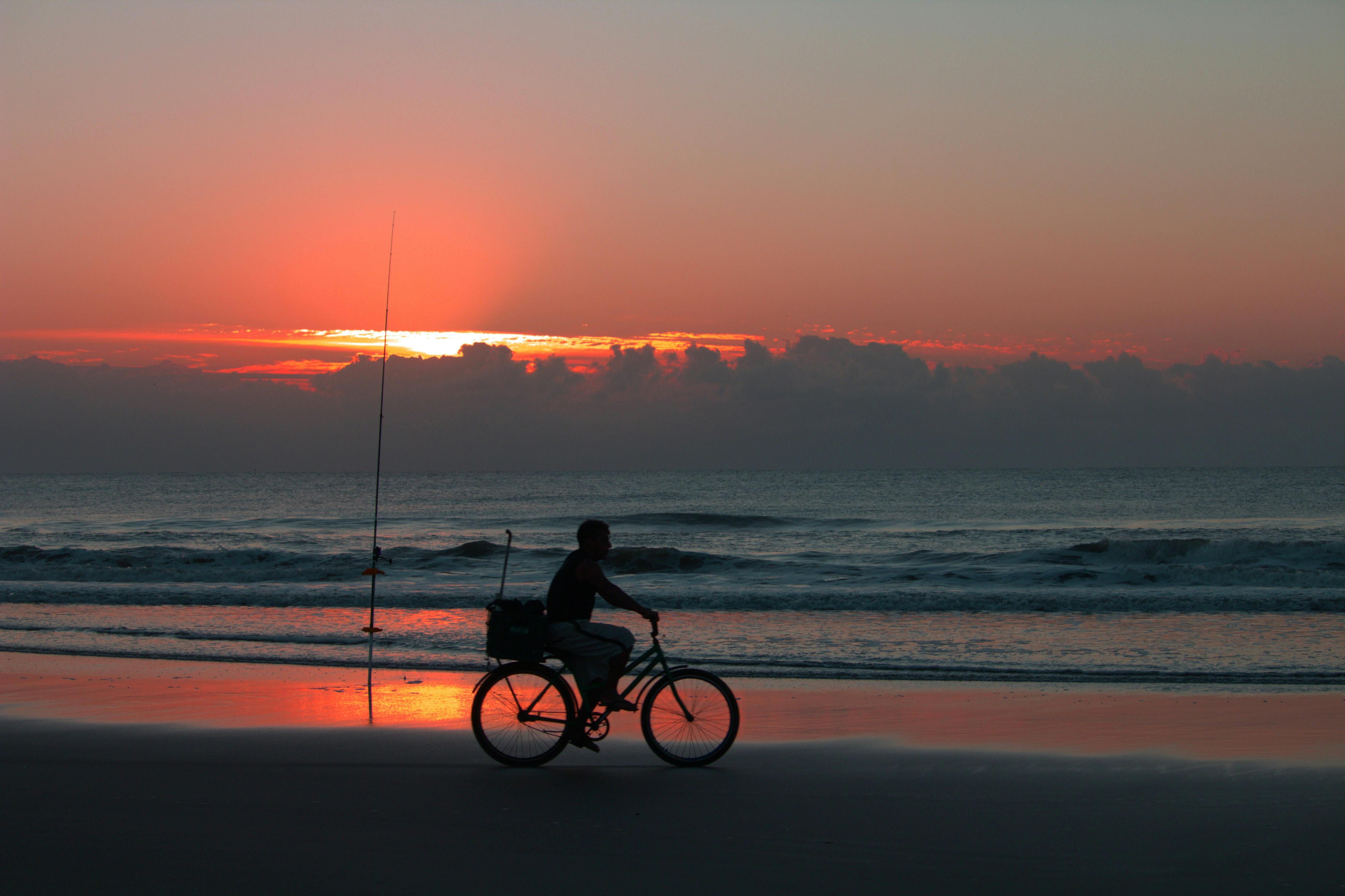 Fisherman on Bicycle on Beach · Free Stock Photo